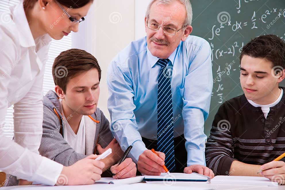 Teacher with High School Students Stock Image - Image of listening ...
