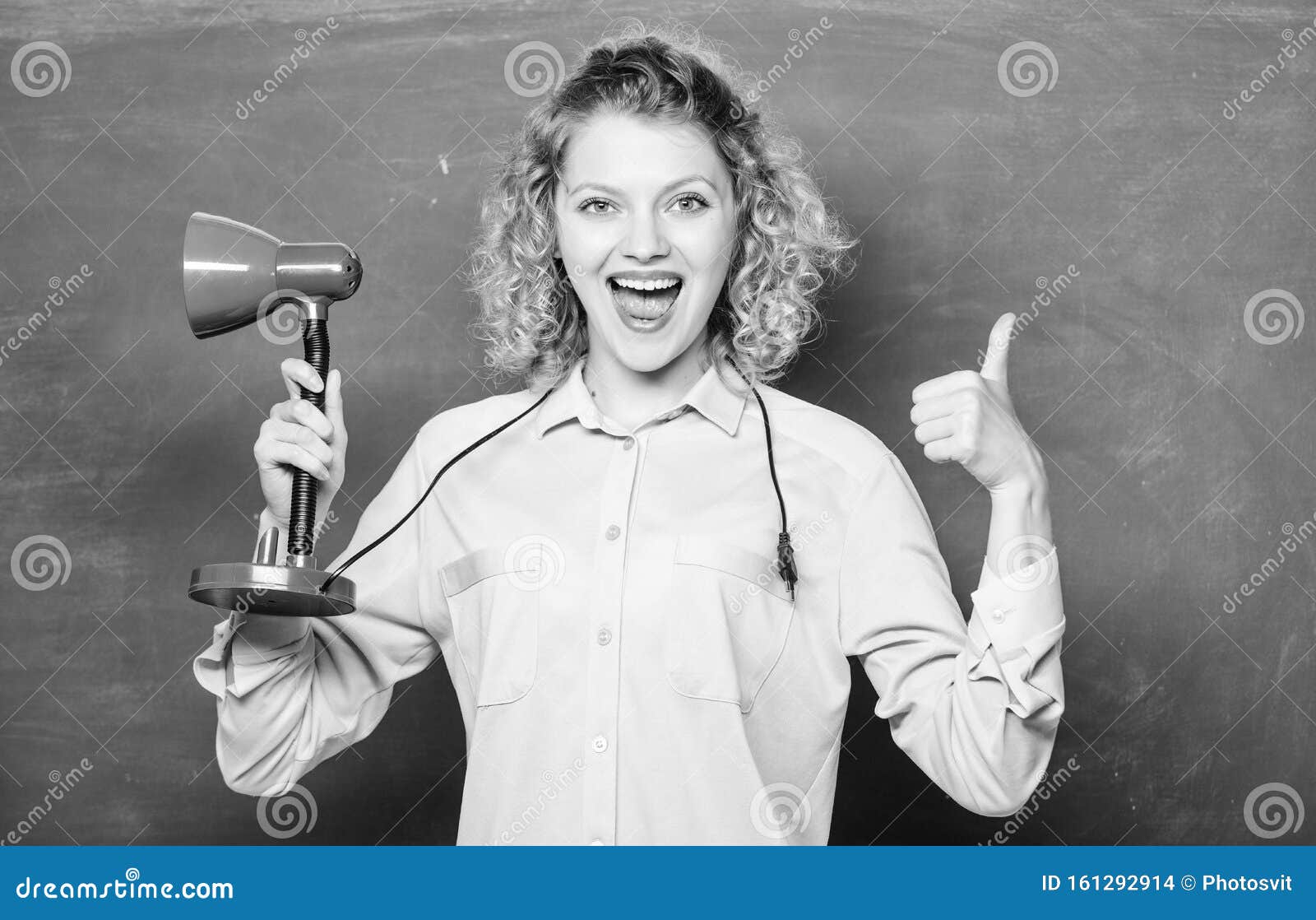 Teacher Hold Table Lamp Chalkboard Background. Bright Shiny Idea ...