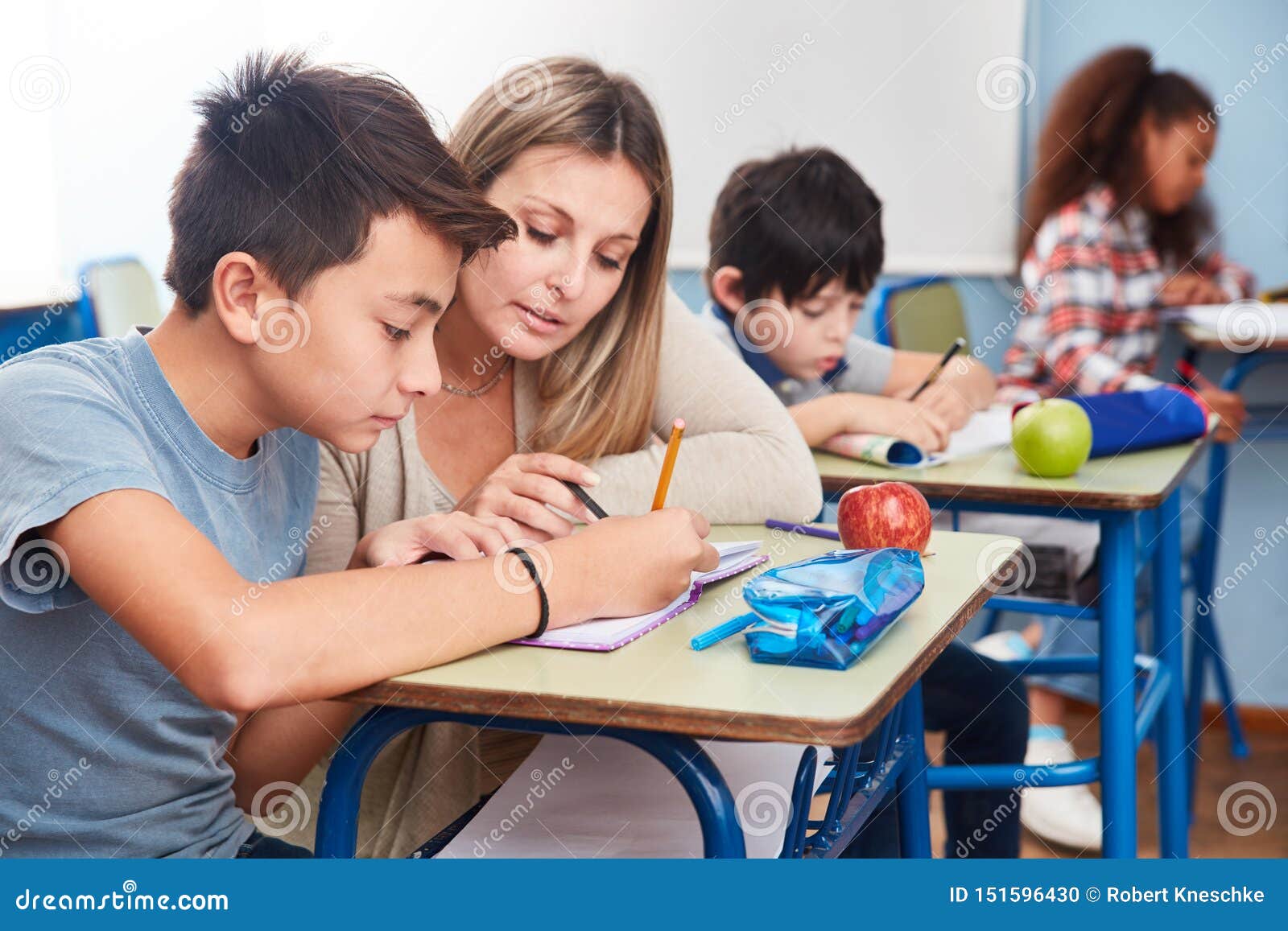 Teacher with Homework Assistance Stock Photo - Image of kids, guidance ...