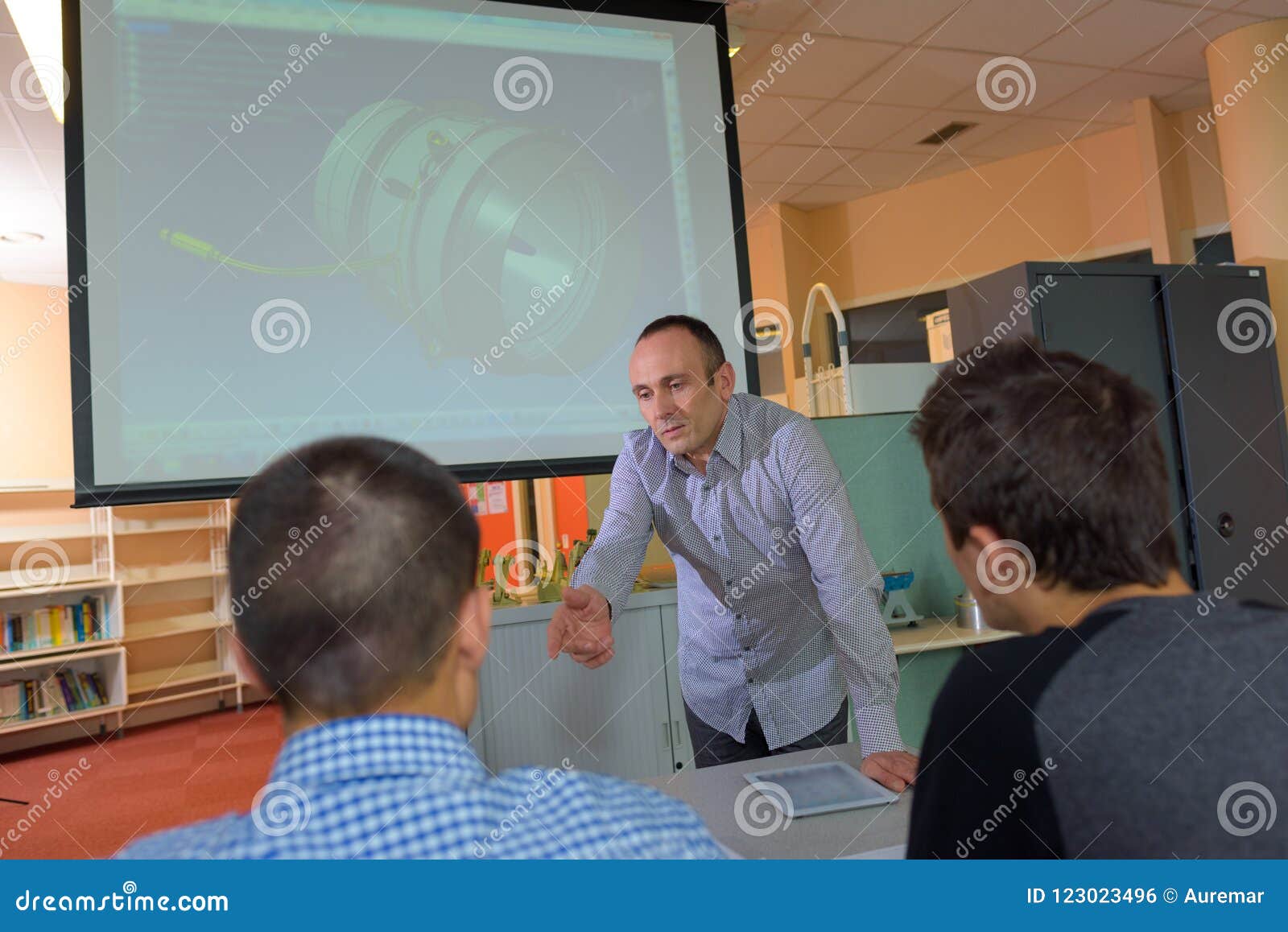 Teacher Interacting with Student Stock Photo - Image of education, desk ...