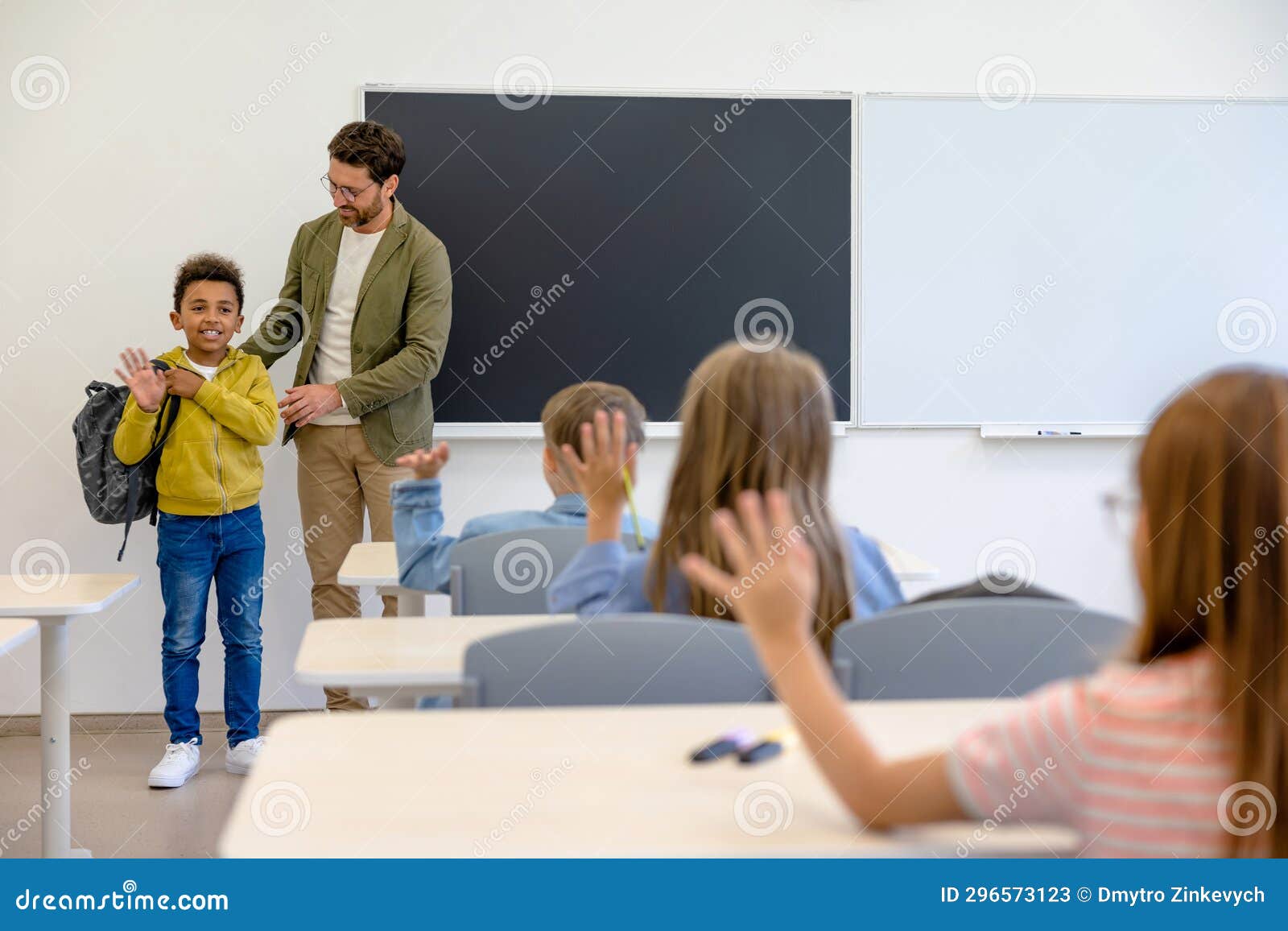 Teacher Introducing a New Boy To the Classmates Stock Image - Image of ...
