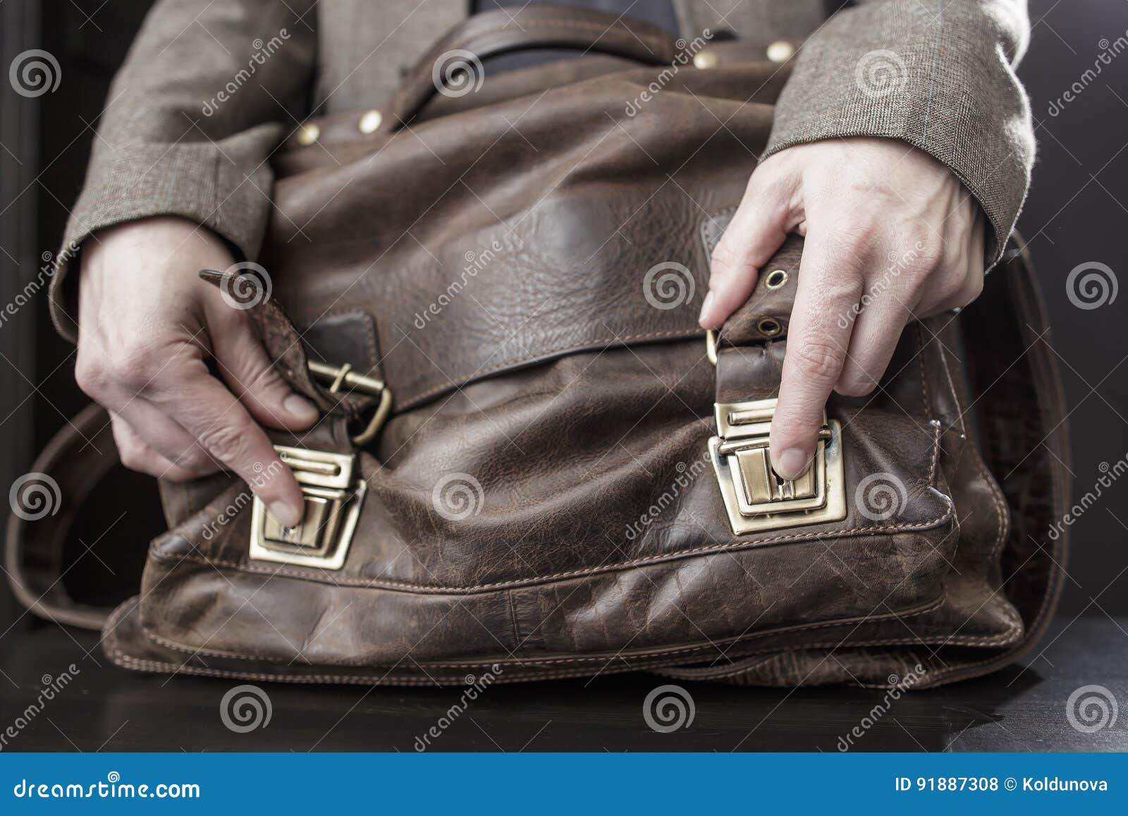 Teacher in a Jacket Gets a Book from an Old Leather Briefcase Stock ...