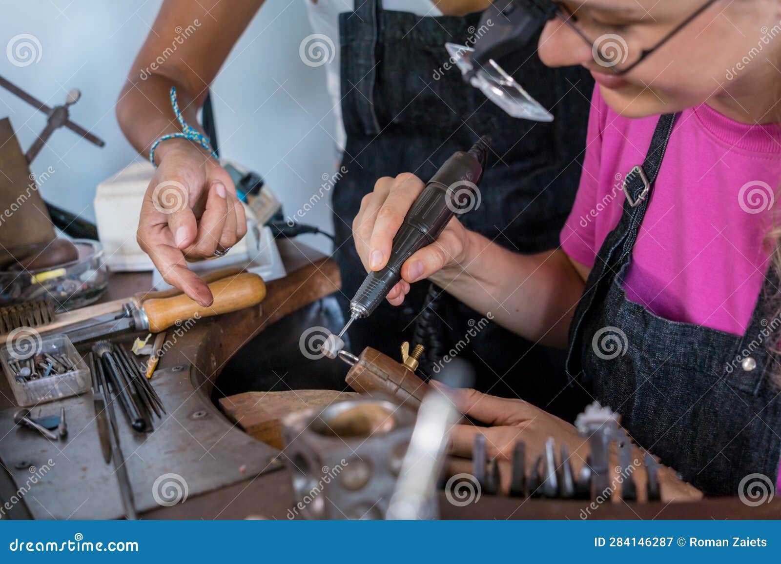 Teacher Jeweler and Student Make Jewelry in Workshop Stock Image ...