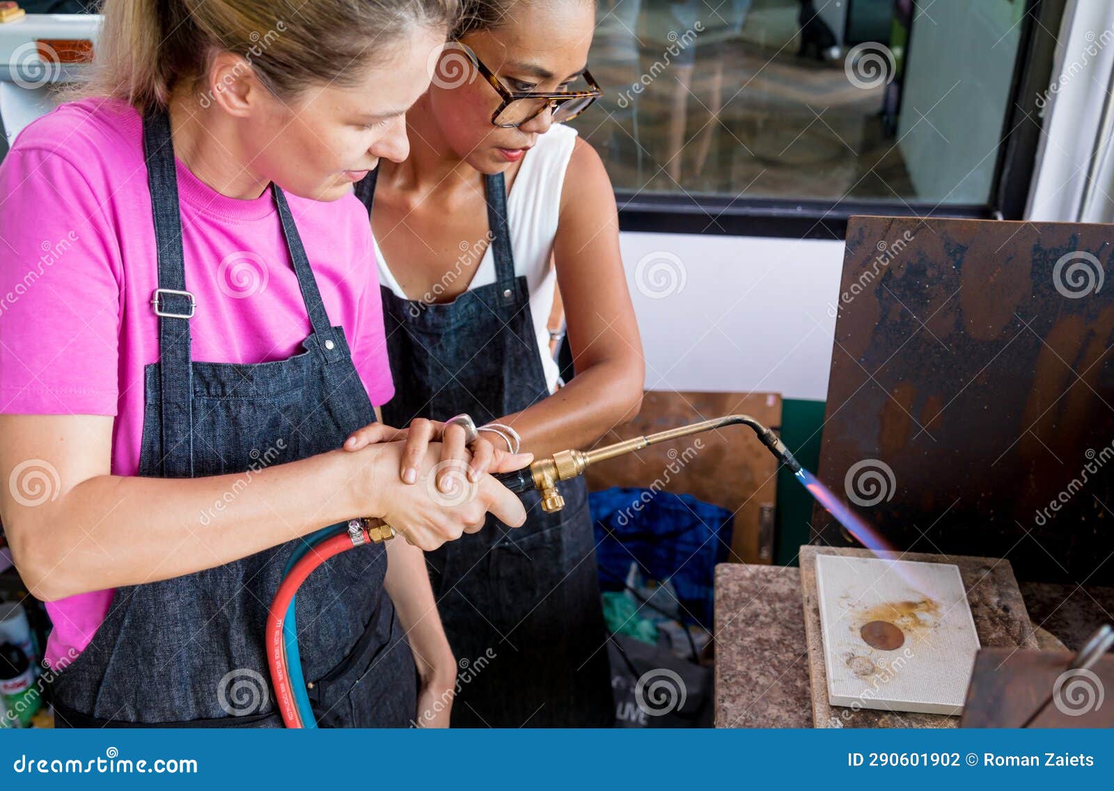 Teacher Jeweler and Student Using Burner in Workshop Stock Photo ...