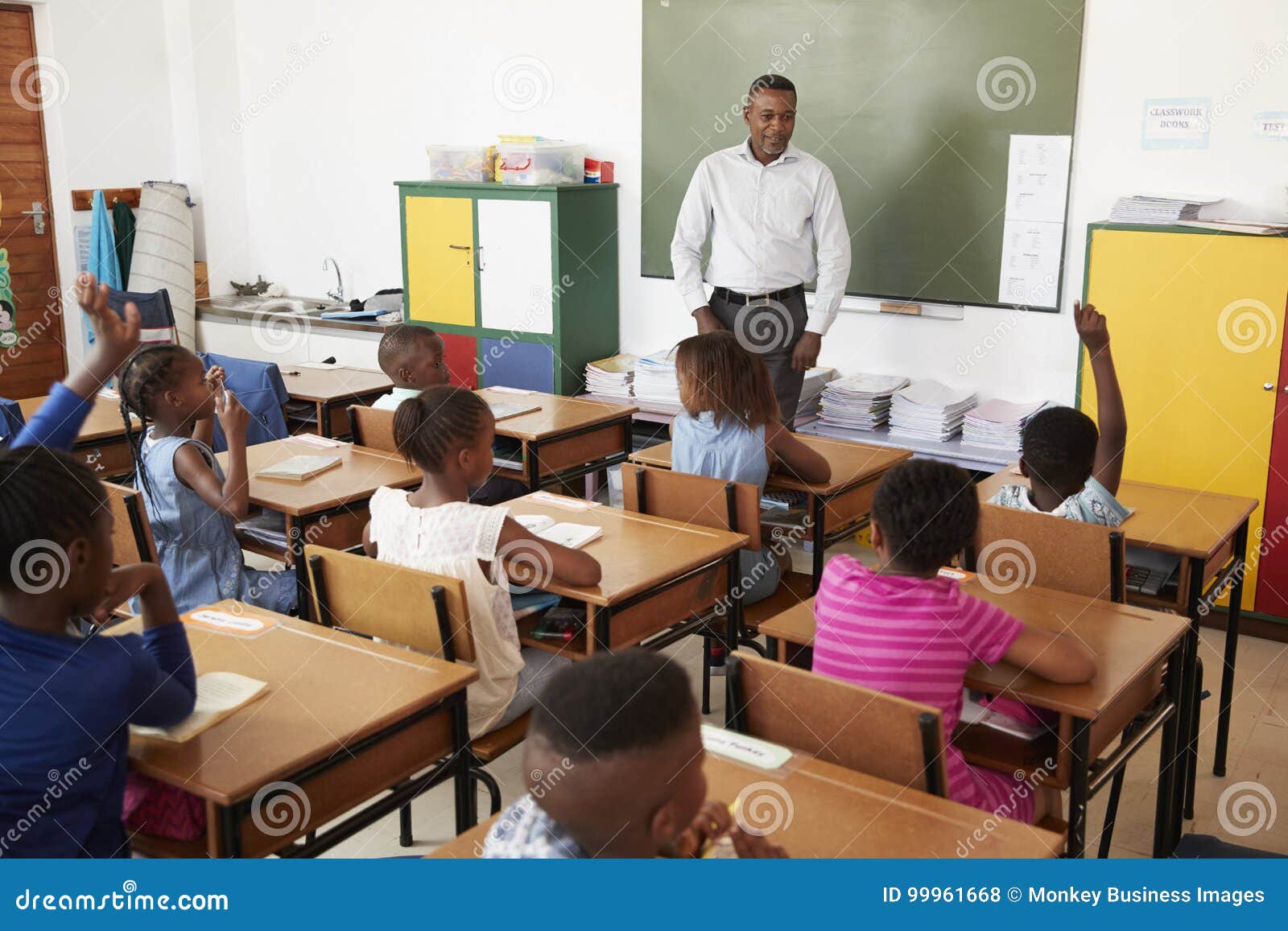 Teacher and Kids during a Lesson at an Elementary School Stock Photo ...