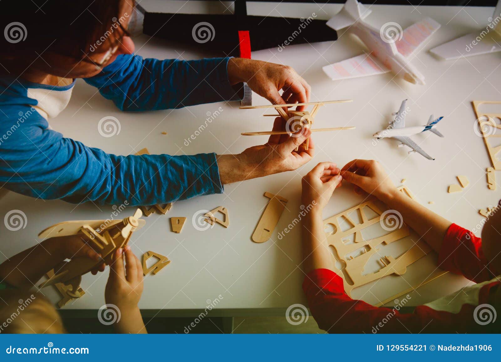 Teacher and Kids Making Toy Planes, Learning Concept Stock Image ...