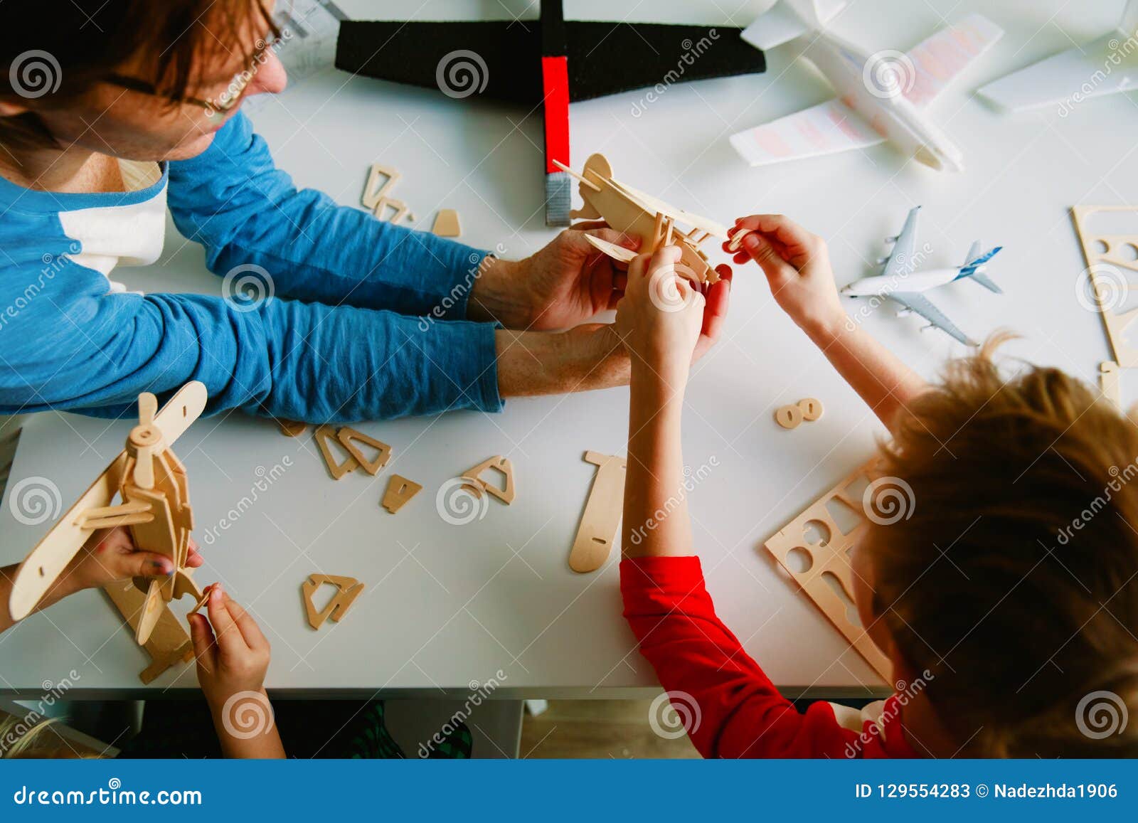 Teacher and Kids Making Toy Planes, Learning Concept Stock Image ...