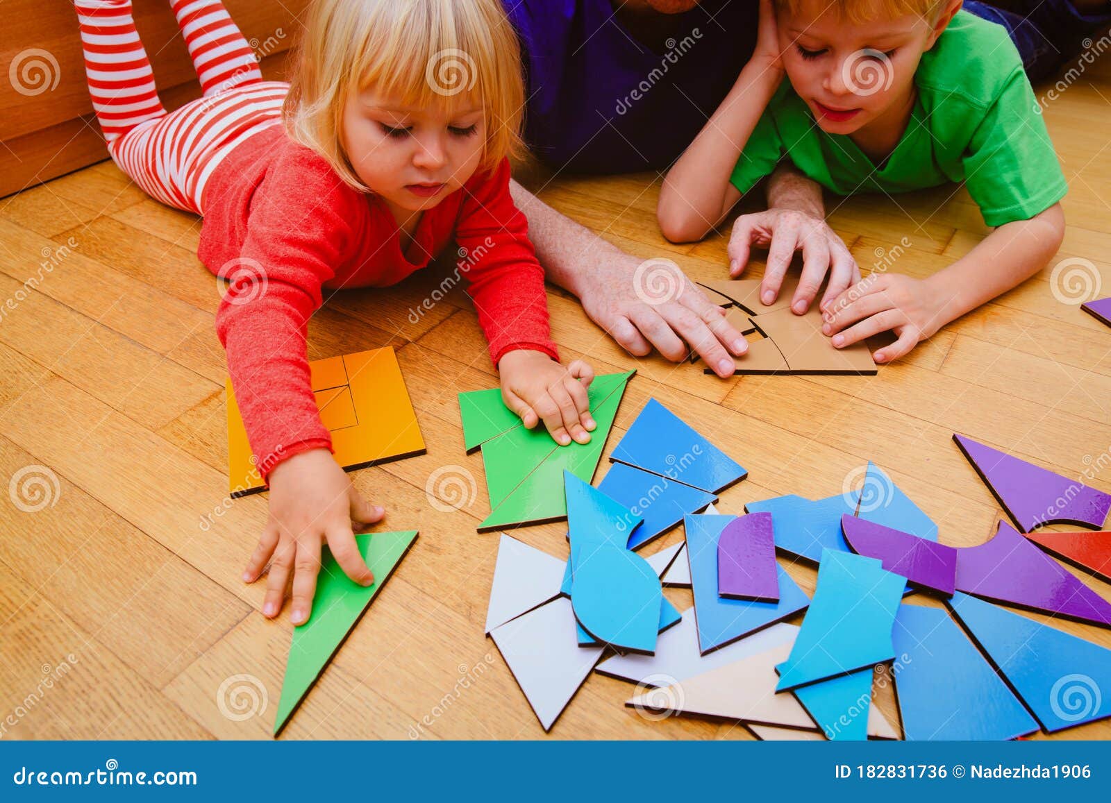 Teacher and Kids Playing with Geometric Shapes Stock Photo - Image of ...