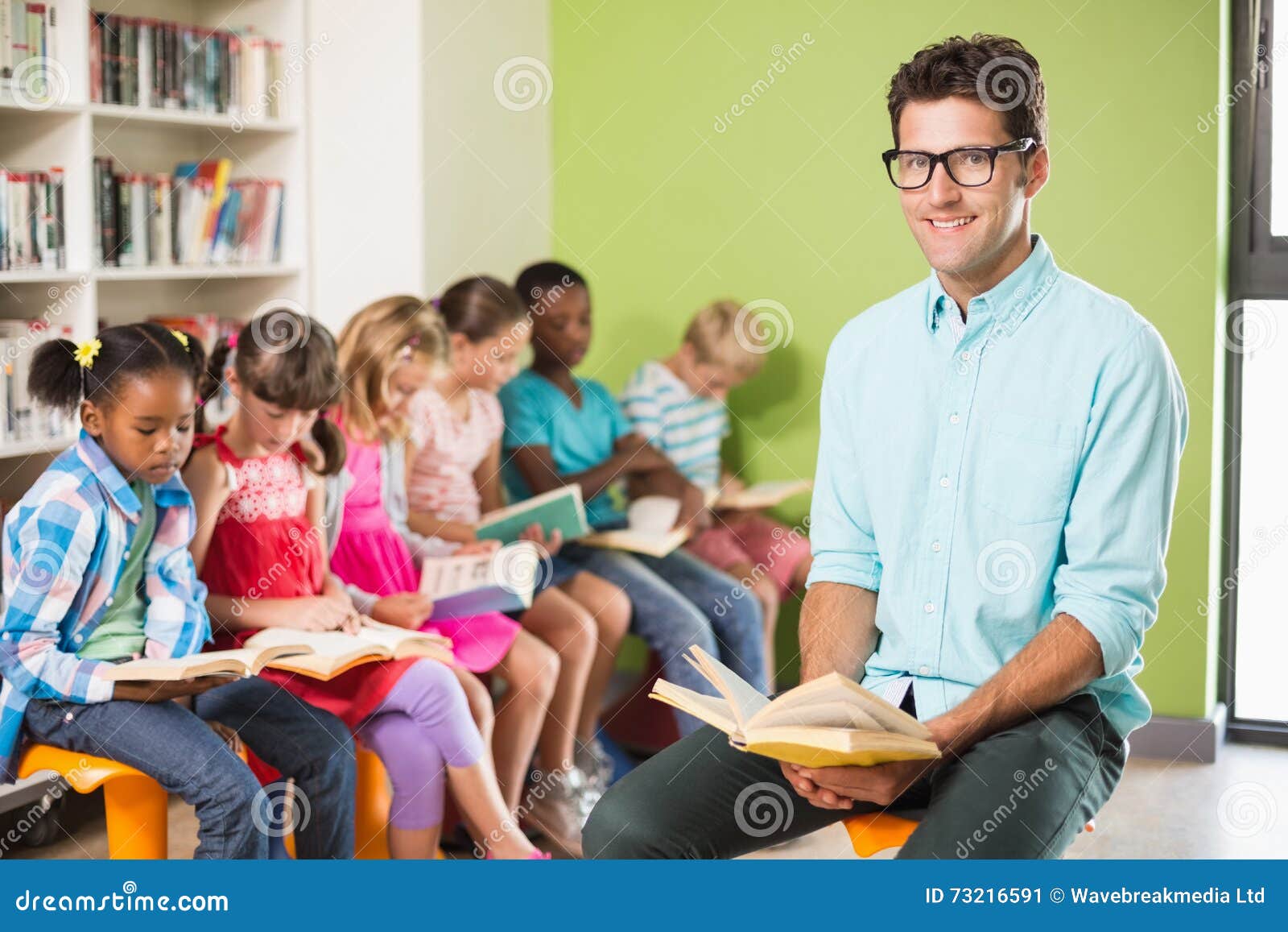 Teacher and Kids Reading Book in Library Stock Image - Image of book ...