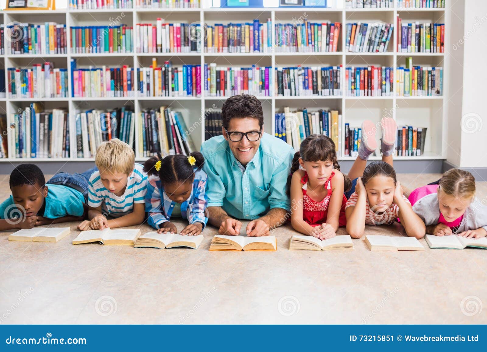 Teacher and Kids Reading Book in Library Stock Image - Image of ...