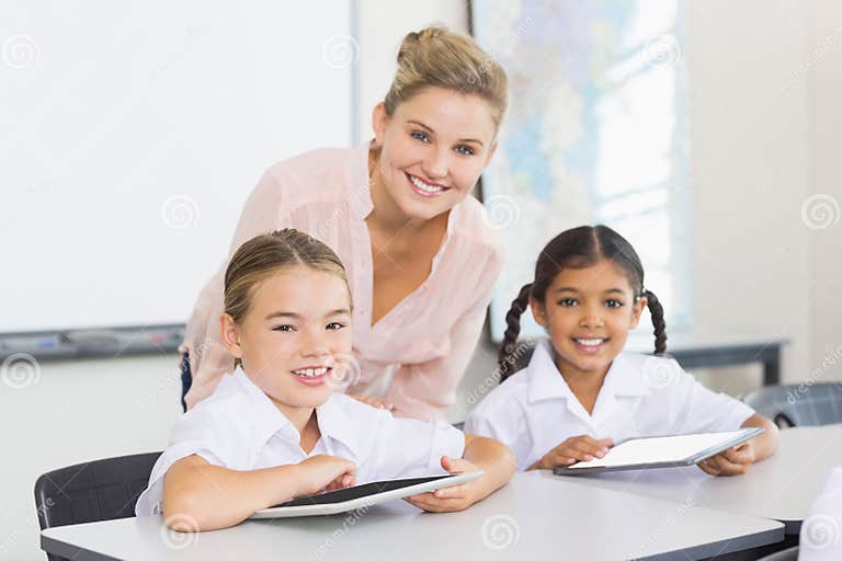 Teacher and Kids Using Digital Tablet Stock Photo - Image of female ...