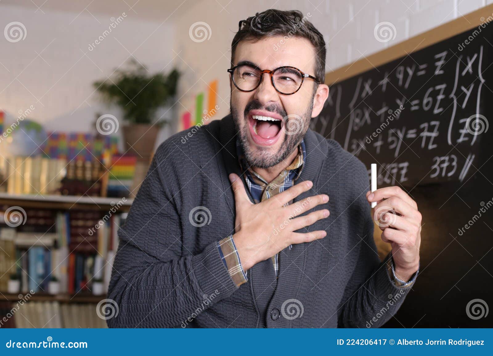 Teacher Laughing Out Loud in Classroom Stock Image - Image of humor ...