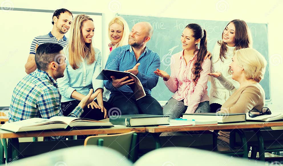 Teacher Laughing with Students Stock Image - Image of clothing, lecture ...