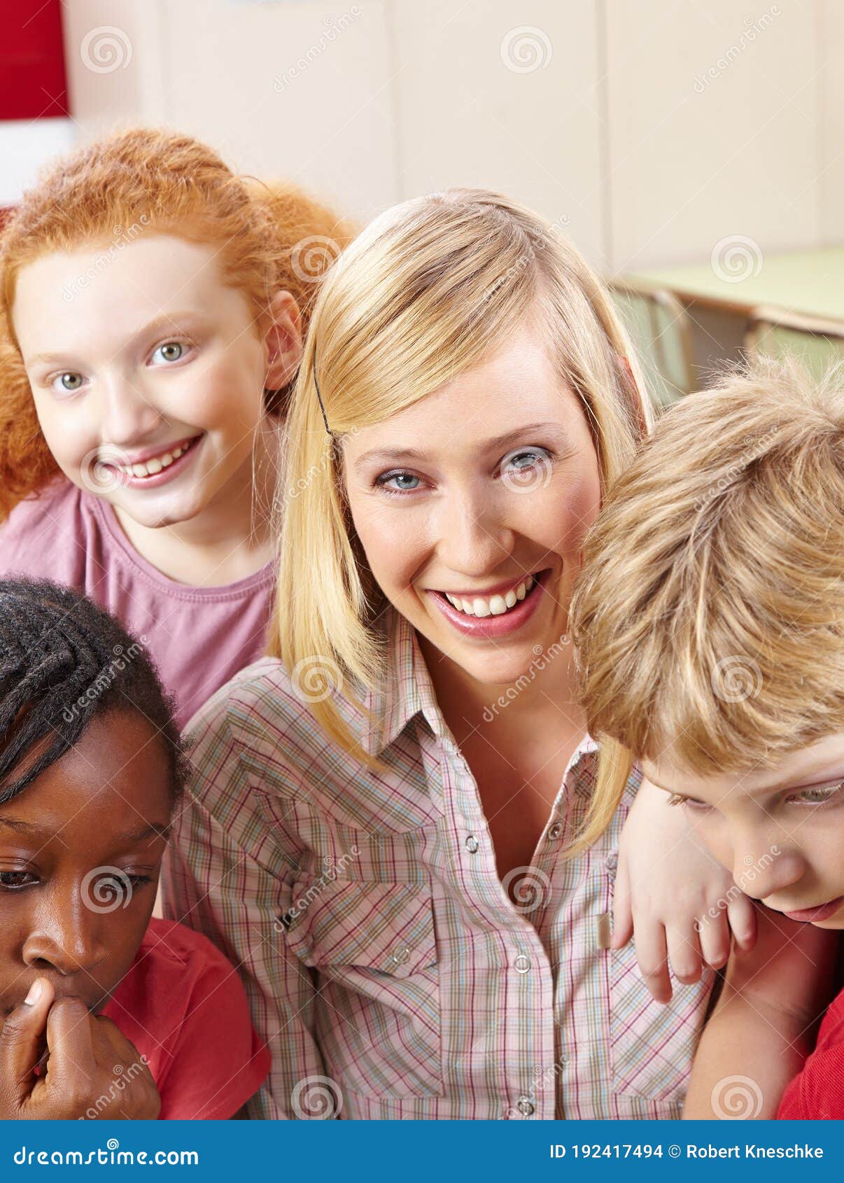 Teacher Laughs with Students in Class Stock Photo - Image of team ...