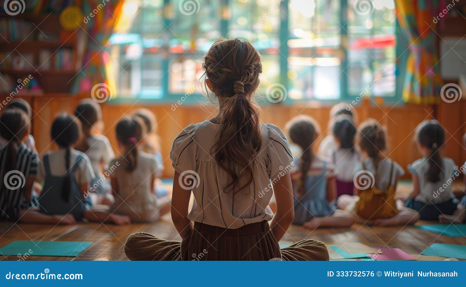 Teacher Leading a Group of Children in a Classroom Setting Stock ...