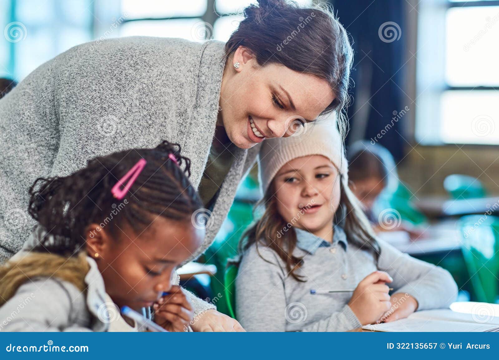 Teacher, Learning and Help Children in Class Writing in Notebook for ...