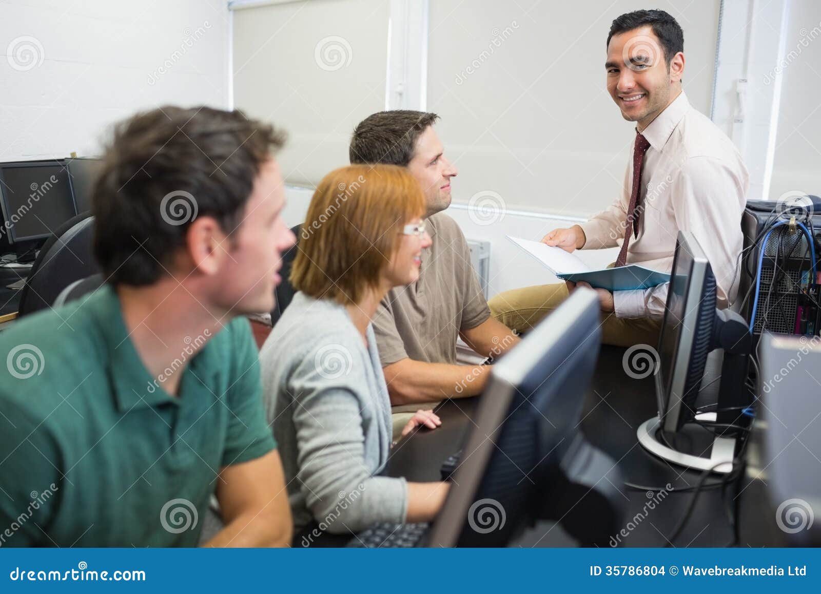 Teacher and Mature Students in Computer Room Stock Photo - Image of ...