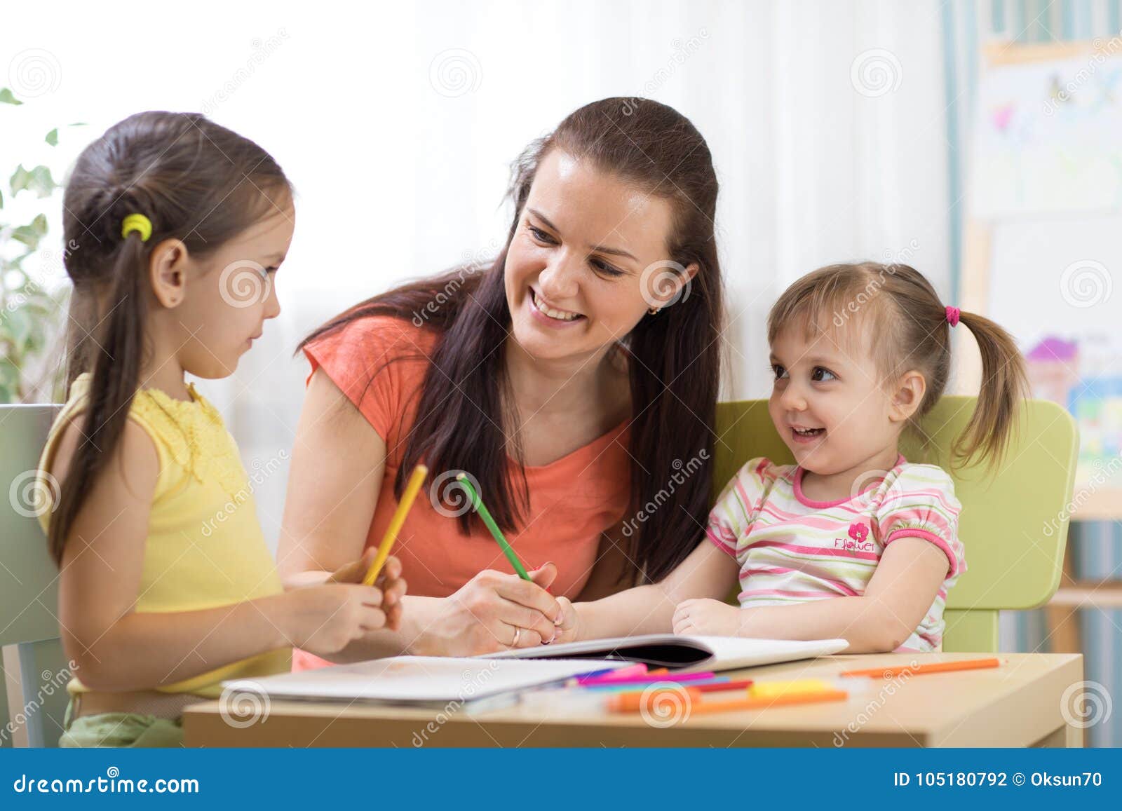 Teacher Mom Working with Creative Kids Stock Photo - Image of leisure ...
