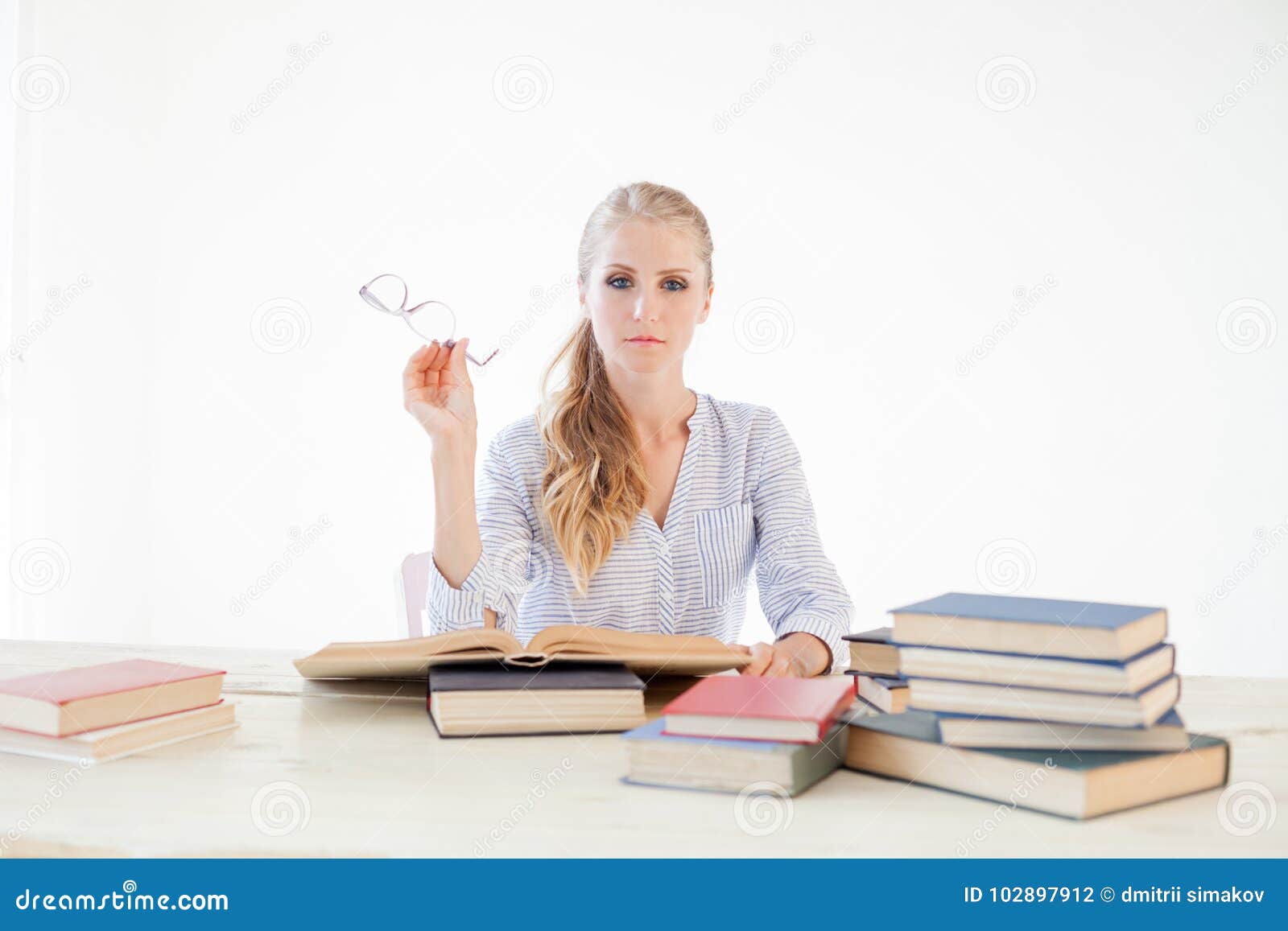 Teacher in the Office Preparing for the Lesson Many Books Stock Photo ...