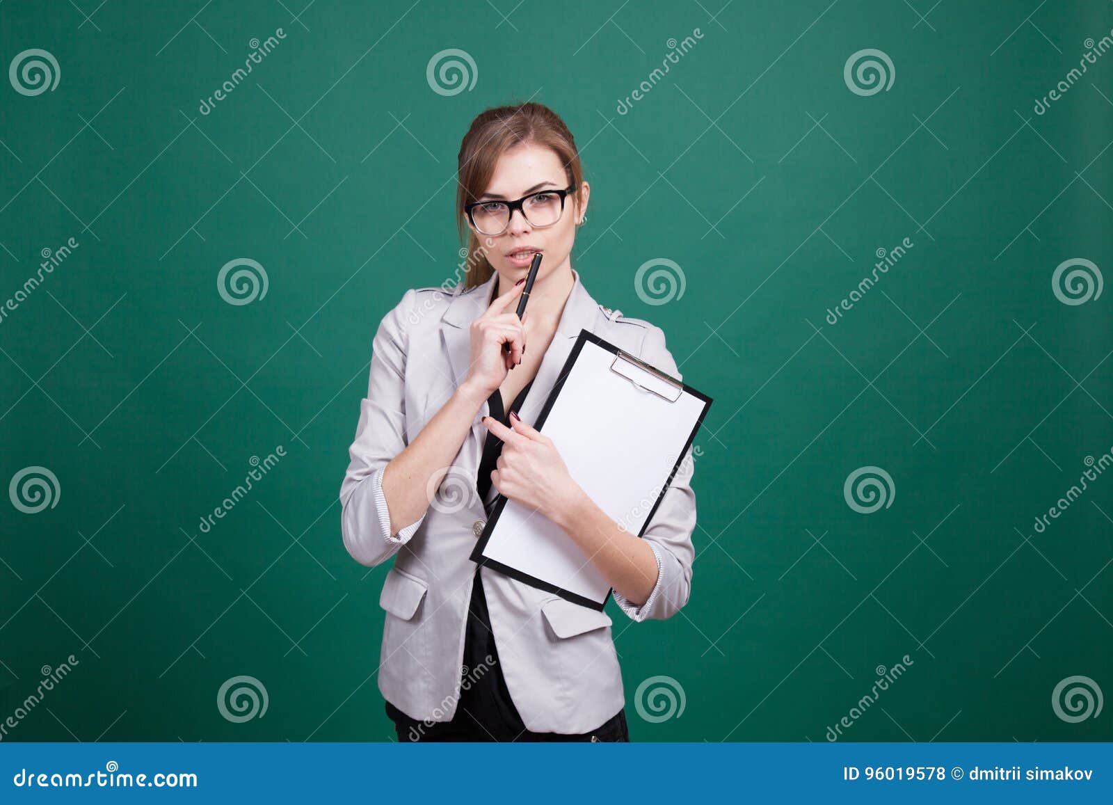Teacher with Papers in Green Boards Stock Photo - Image of blackboard ...