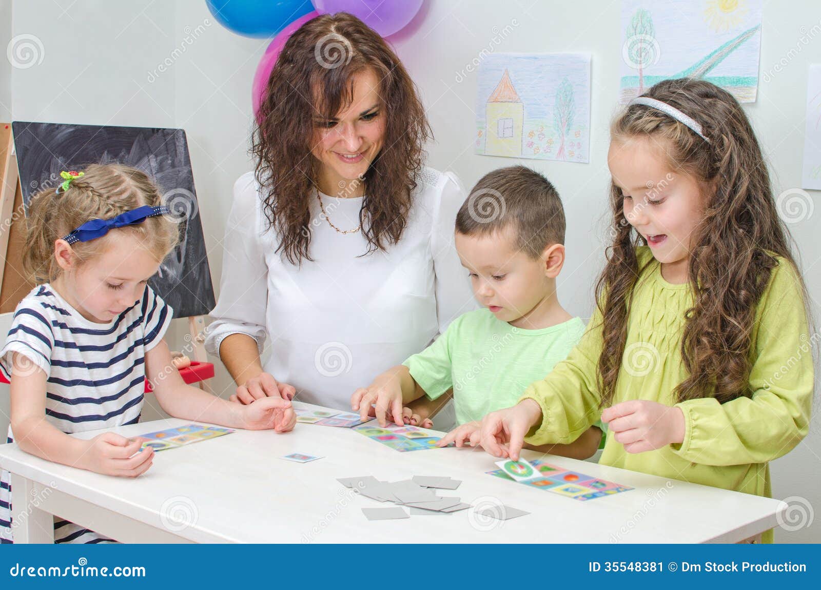 Teacher Plays with Children Stock Image - Image of male, class: 35548381