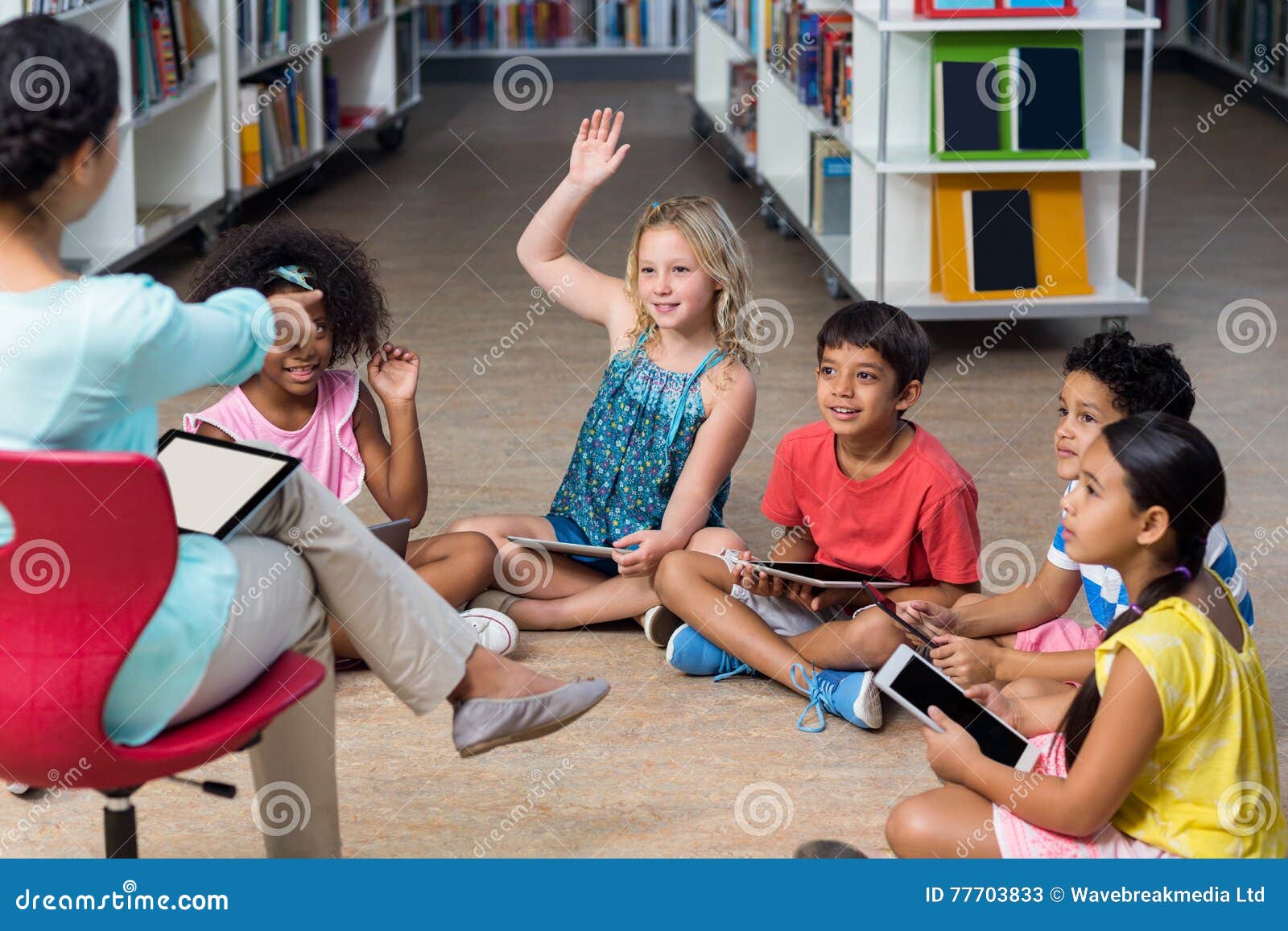 Teacher Pointing at Arm Raised Student Stock Image - Image of female ...