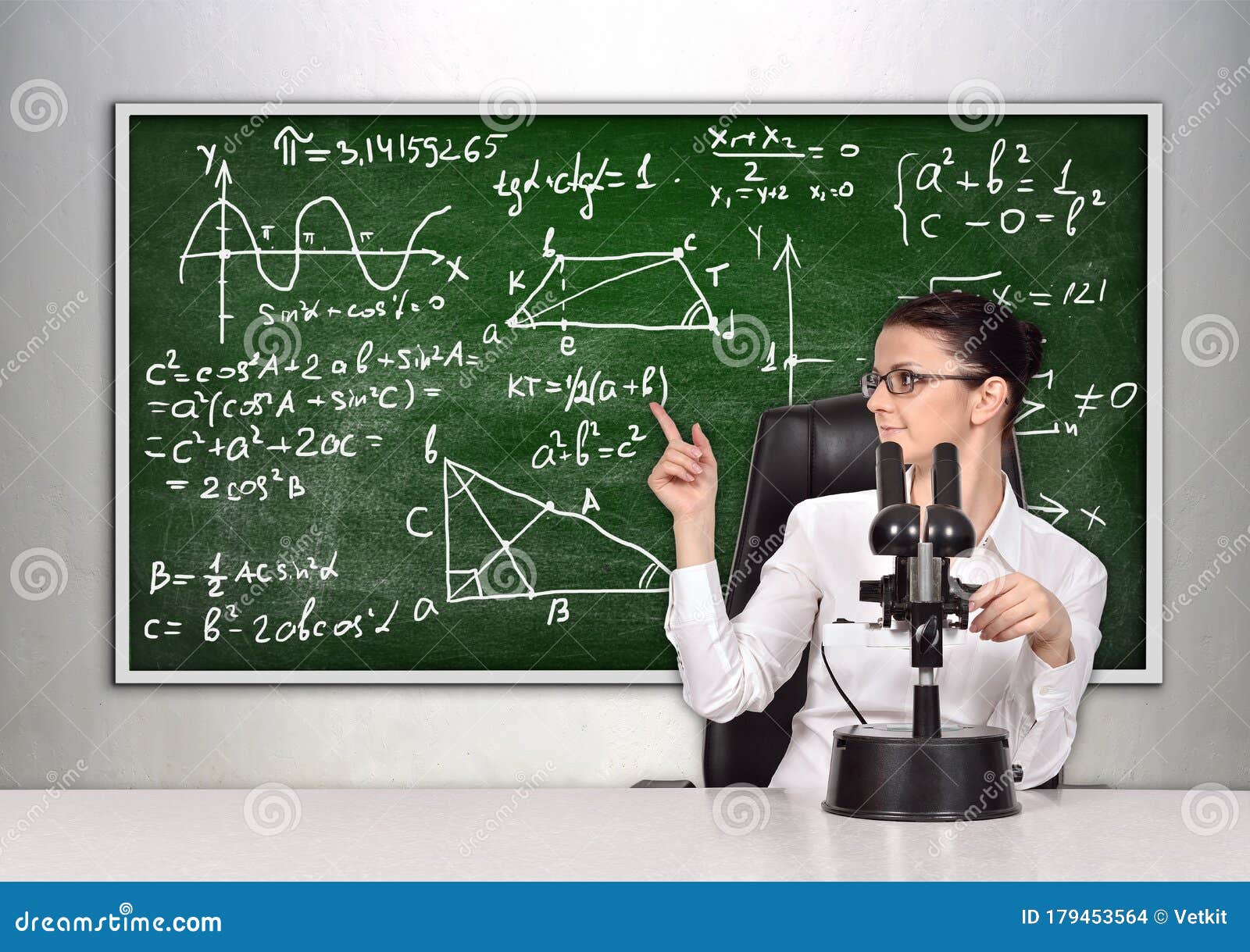 Teacher Pointing on Drawing Formula on Chalkboard Stock Photo - Image ...