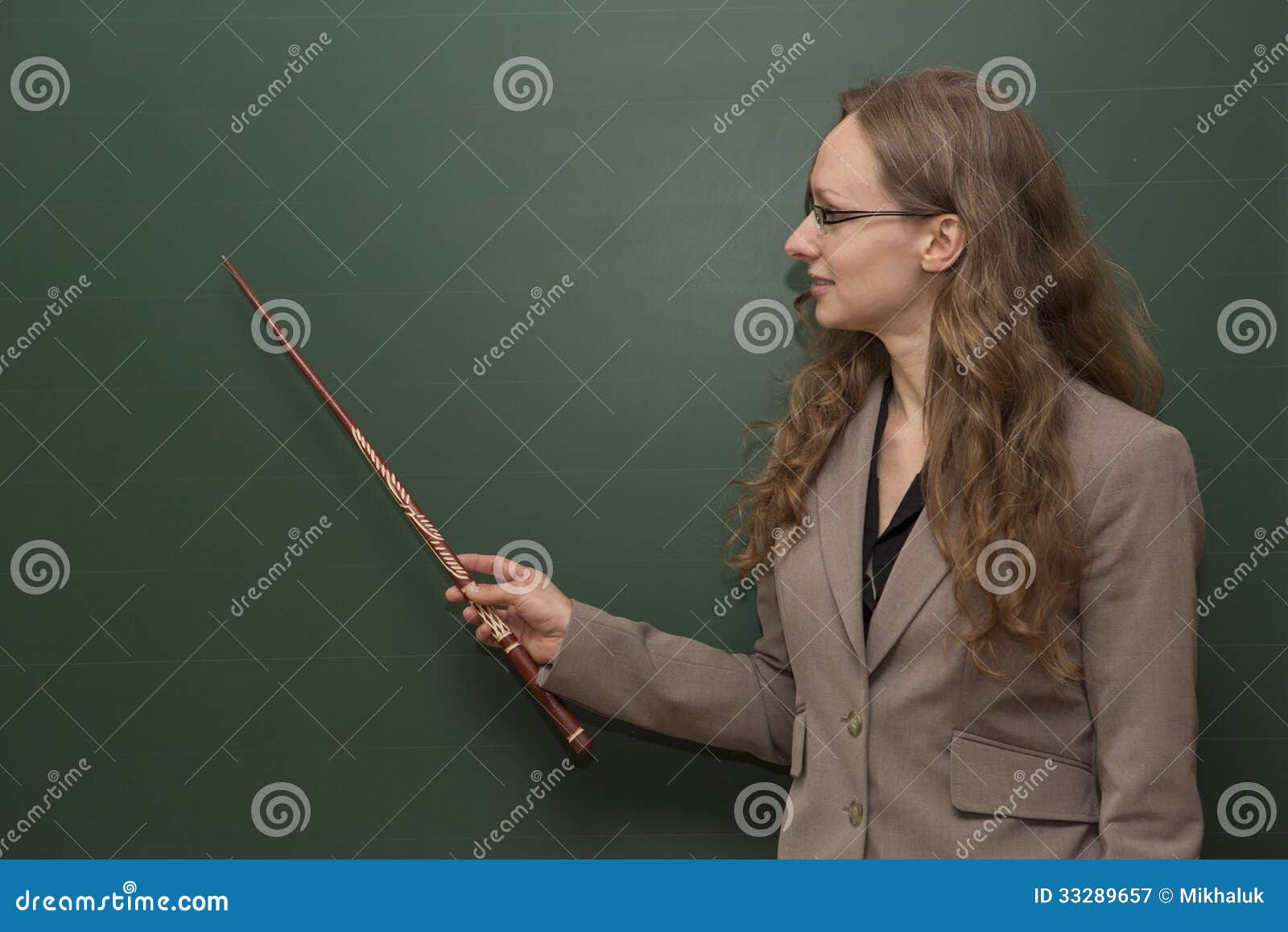 Teacher is Pointing To Something on the Board Stock Image - Image of ...