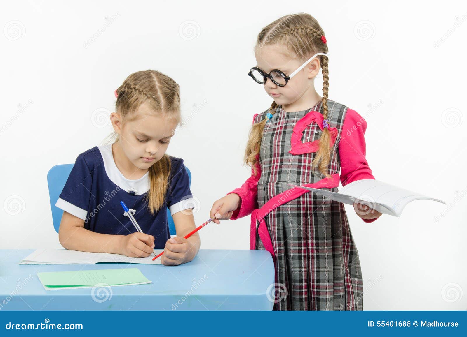 The Teacher Points To a Pointer in the Notebook Student Stock Photo ...