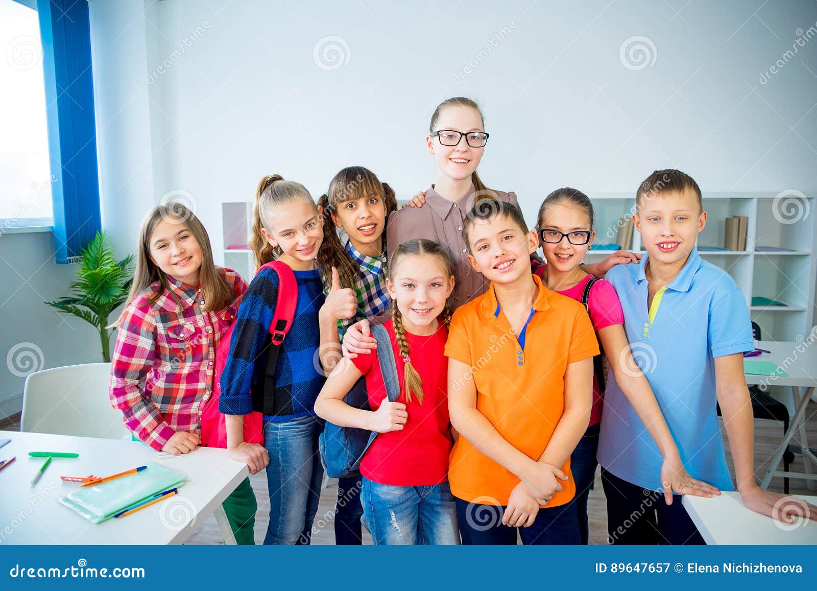 Teacher Posing with Her Students Stock Image - Image of teacher, happy ...