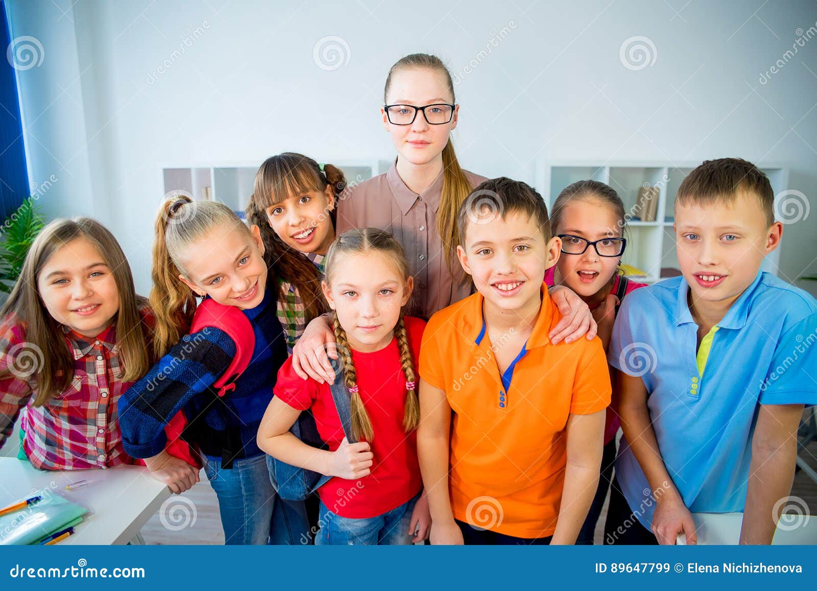 Teacher Posing with Her Students Stock Image - Image of female, lesson ...