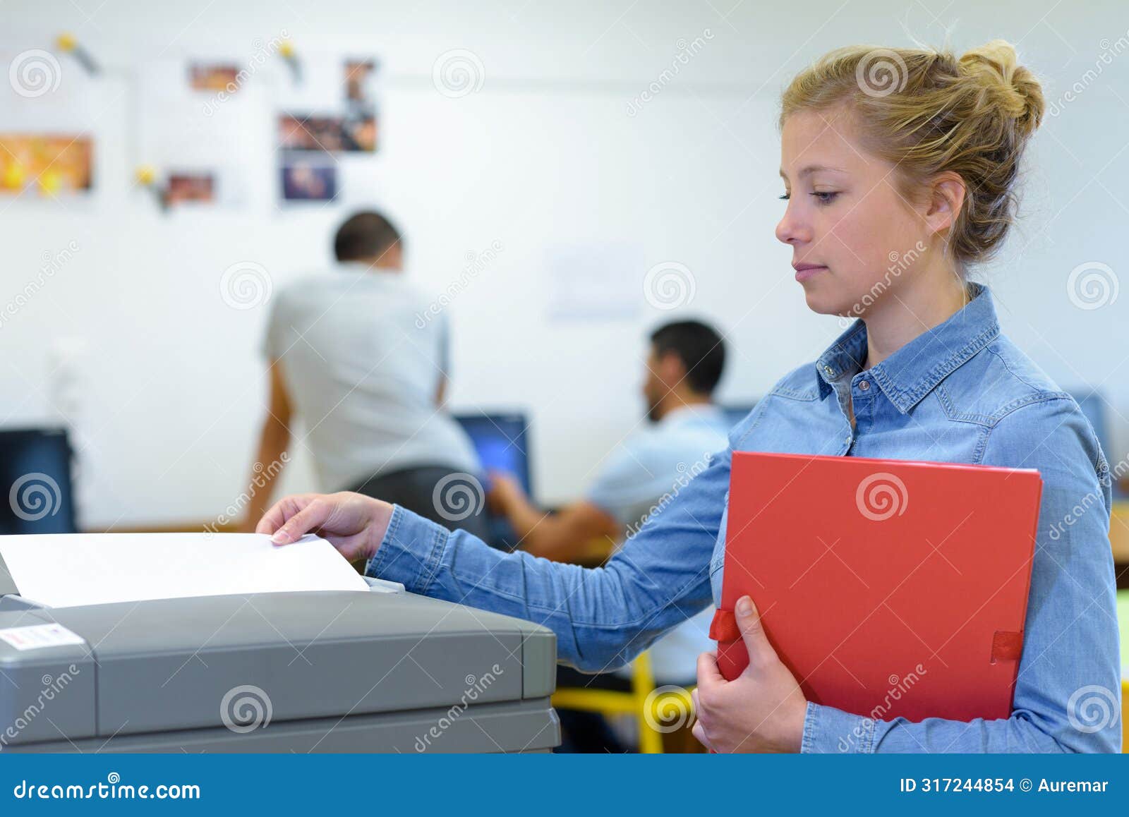 Teacher Printing Off Work Sheets for Next Lesson Stock Photo - Image of ...