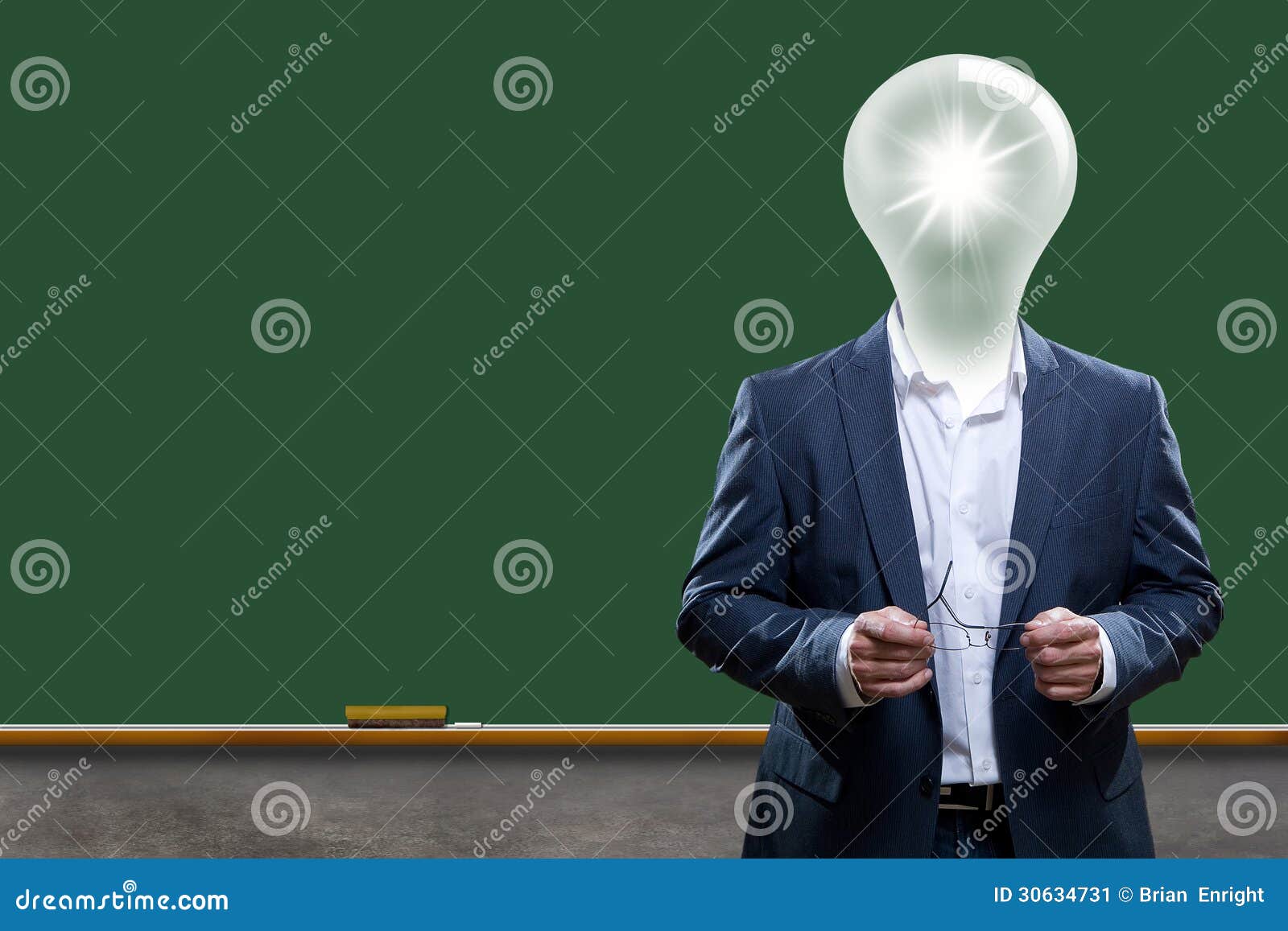 A Teacher or Professor with a Light Bulb for a Head Standing in Front ...