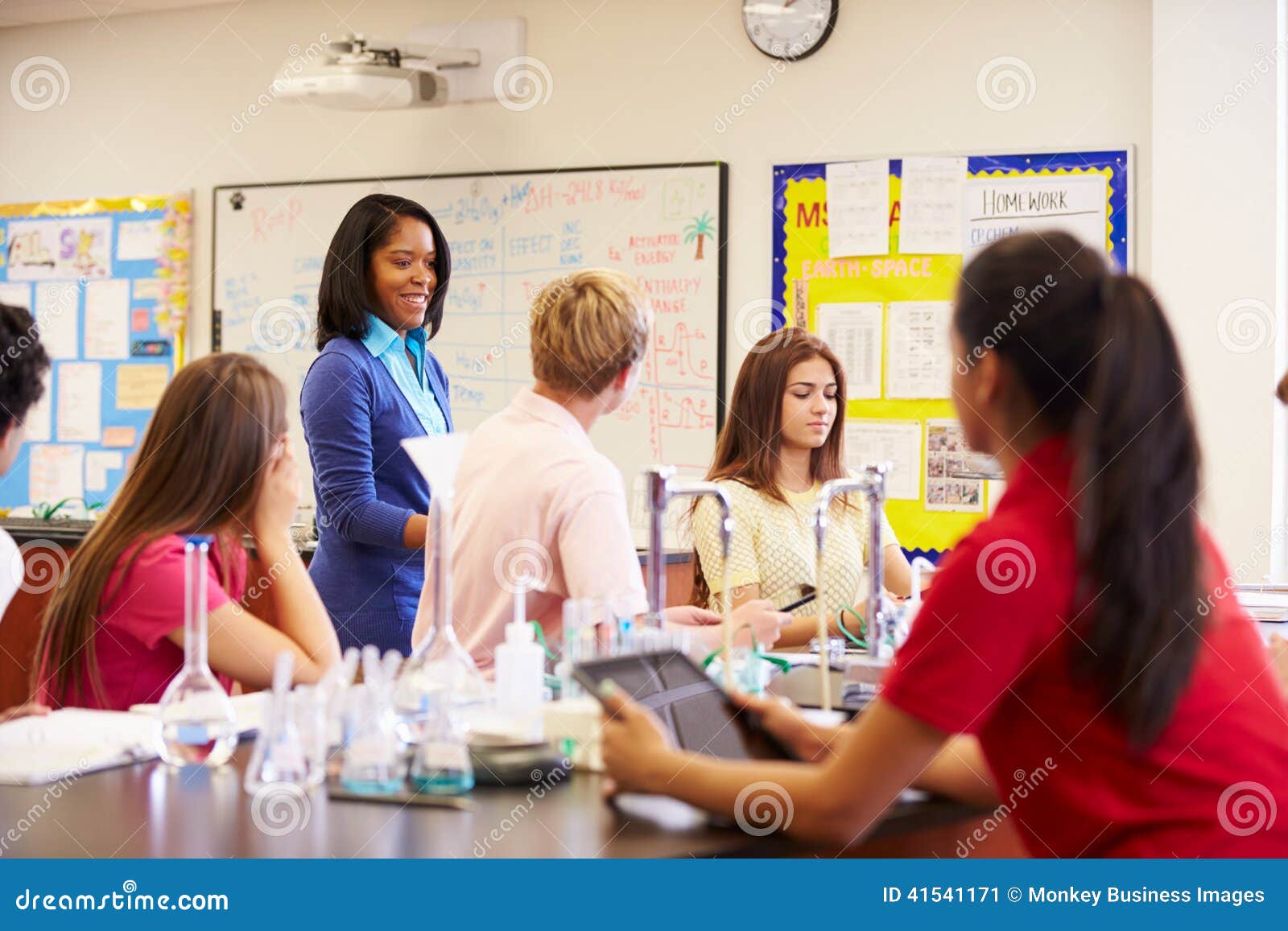 Teacher and Pupils in High School Science Class Stock Image - Image of ...