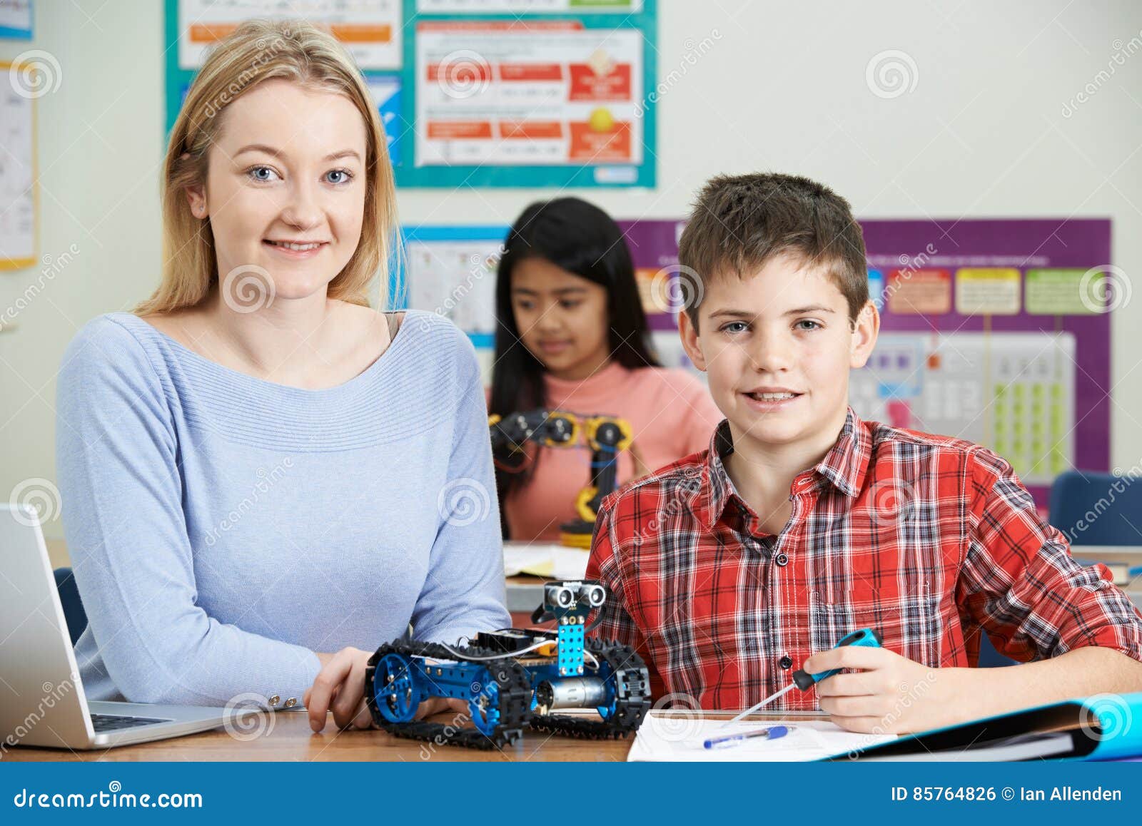 Teacher with Pupils in Science Lesson Studying Robotics Stock Photo ...