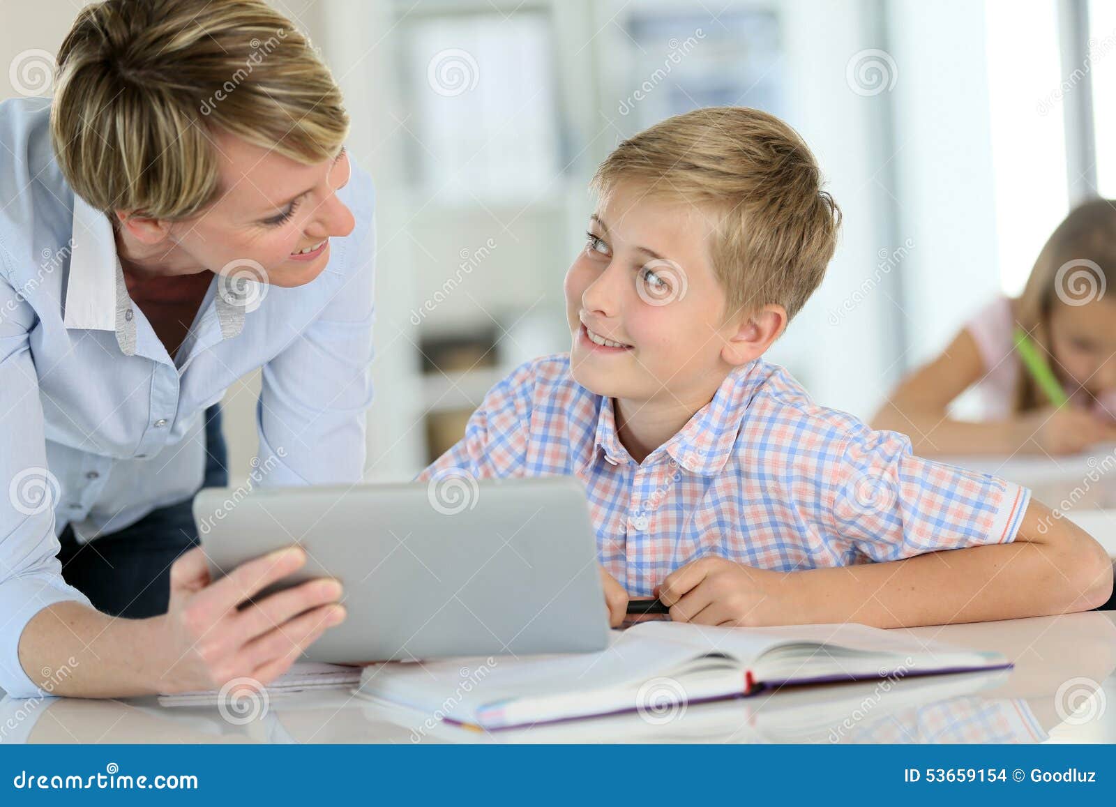 Teacher and Pupils Using Tablet at School Stock Photo - Image of ...