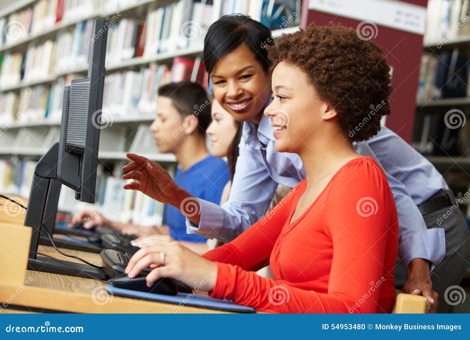 Teacher and Pupils Working on Computers Stock Photo - Image of male ...