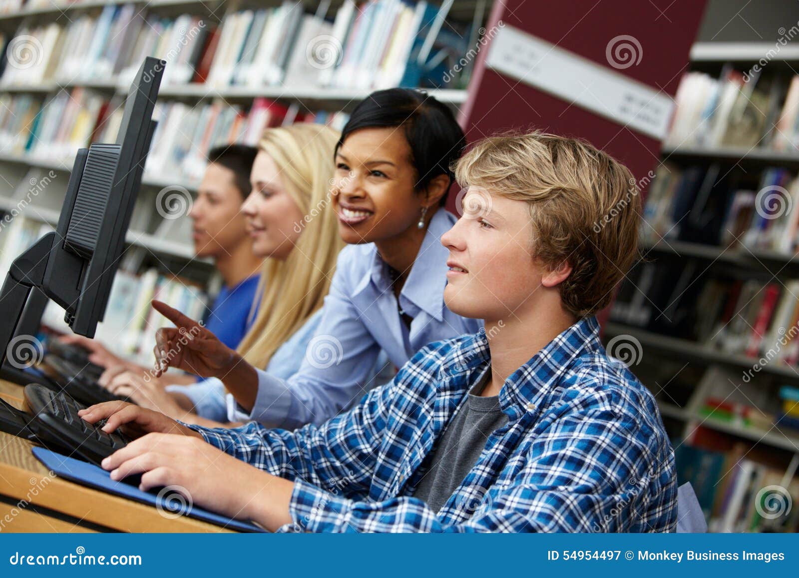Teacher and Pupils Working on Computers Stock Image - Image of boys ...