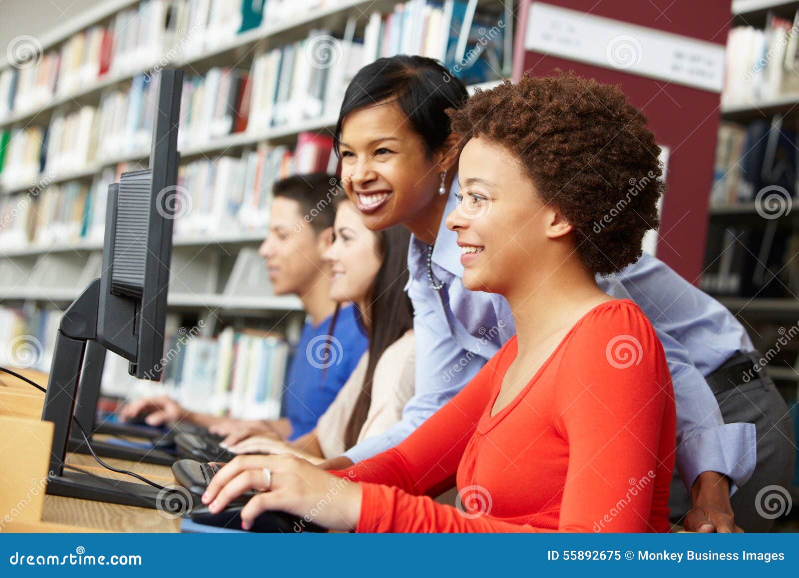Teacher and Pupils Working on Computers Stock Image - Image of ...