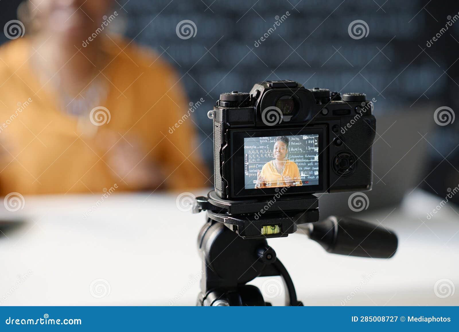 Teacher Recording Lesson on Camera Stock Image - Image of classroom ...