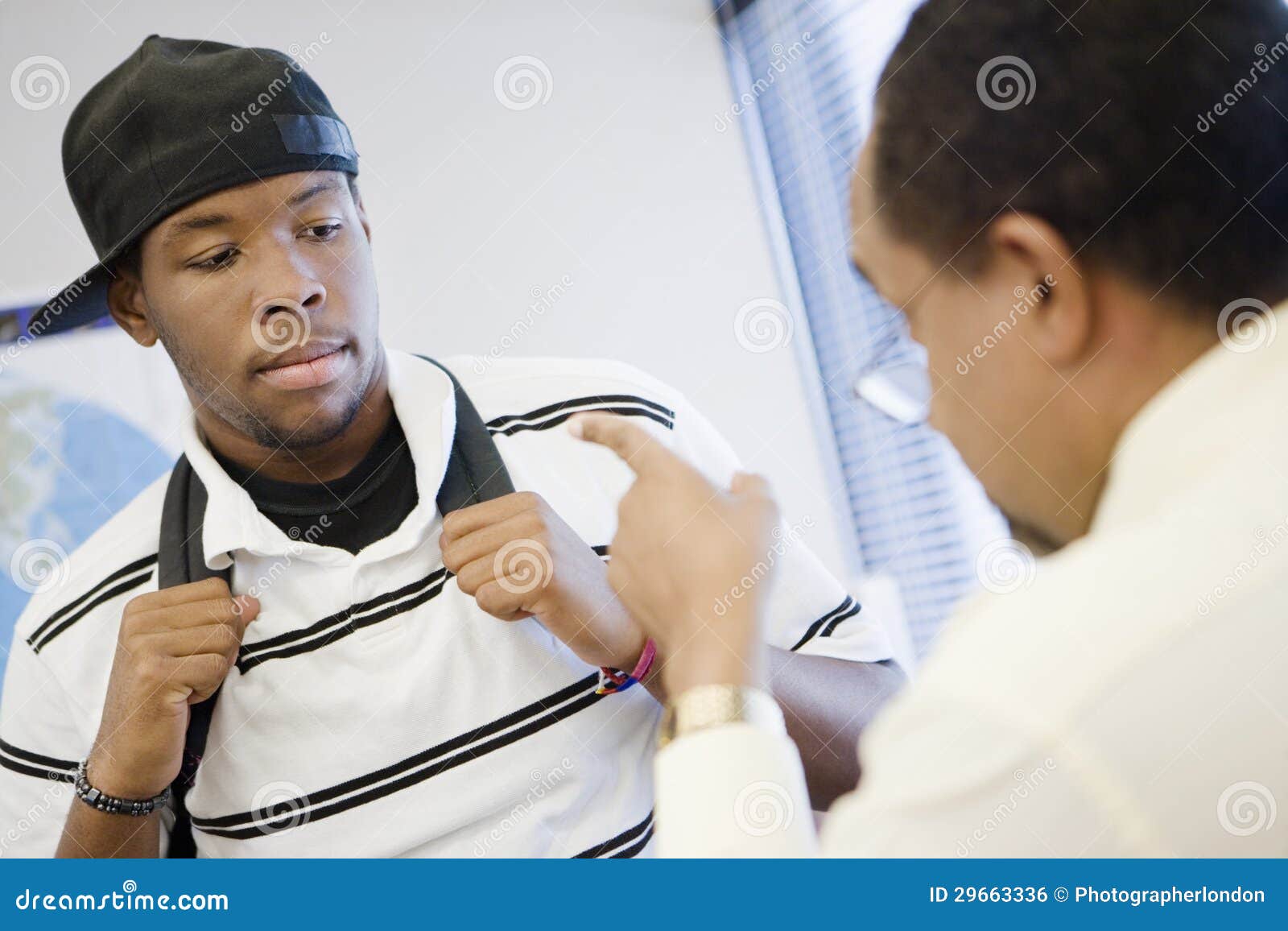Teacher Reprimanding a Student Stock Photo - Image of authority ...