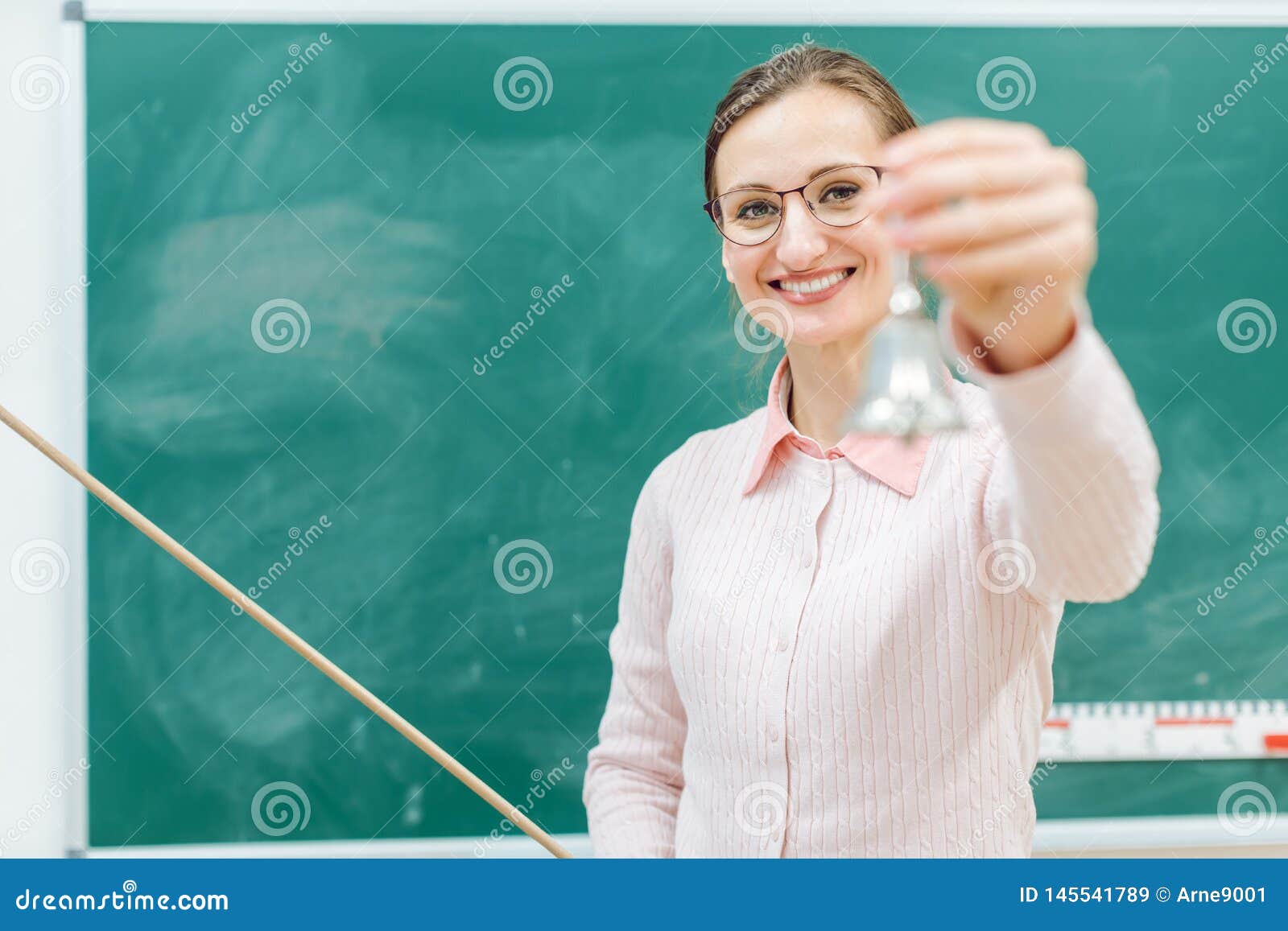 Teacher Ringing the Bell for Class To Begin Stock Image - Image of ...