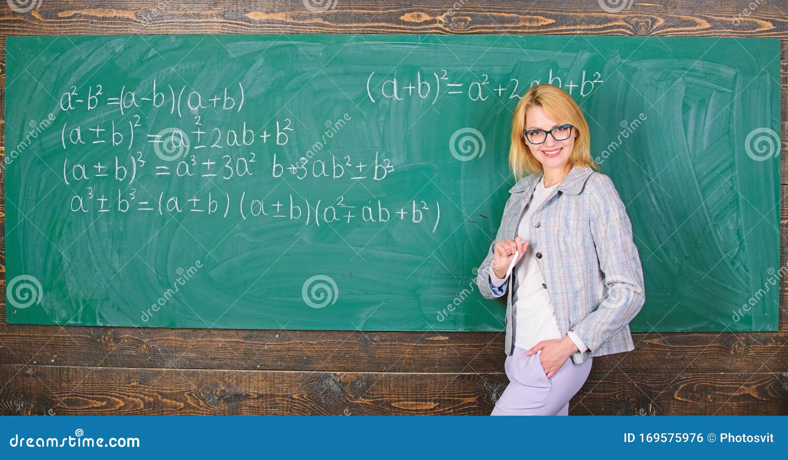 Teacher On School Lesson At Blackboard Woman In Classroom Home