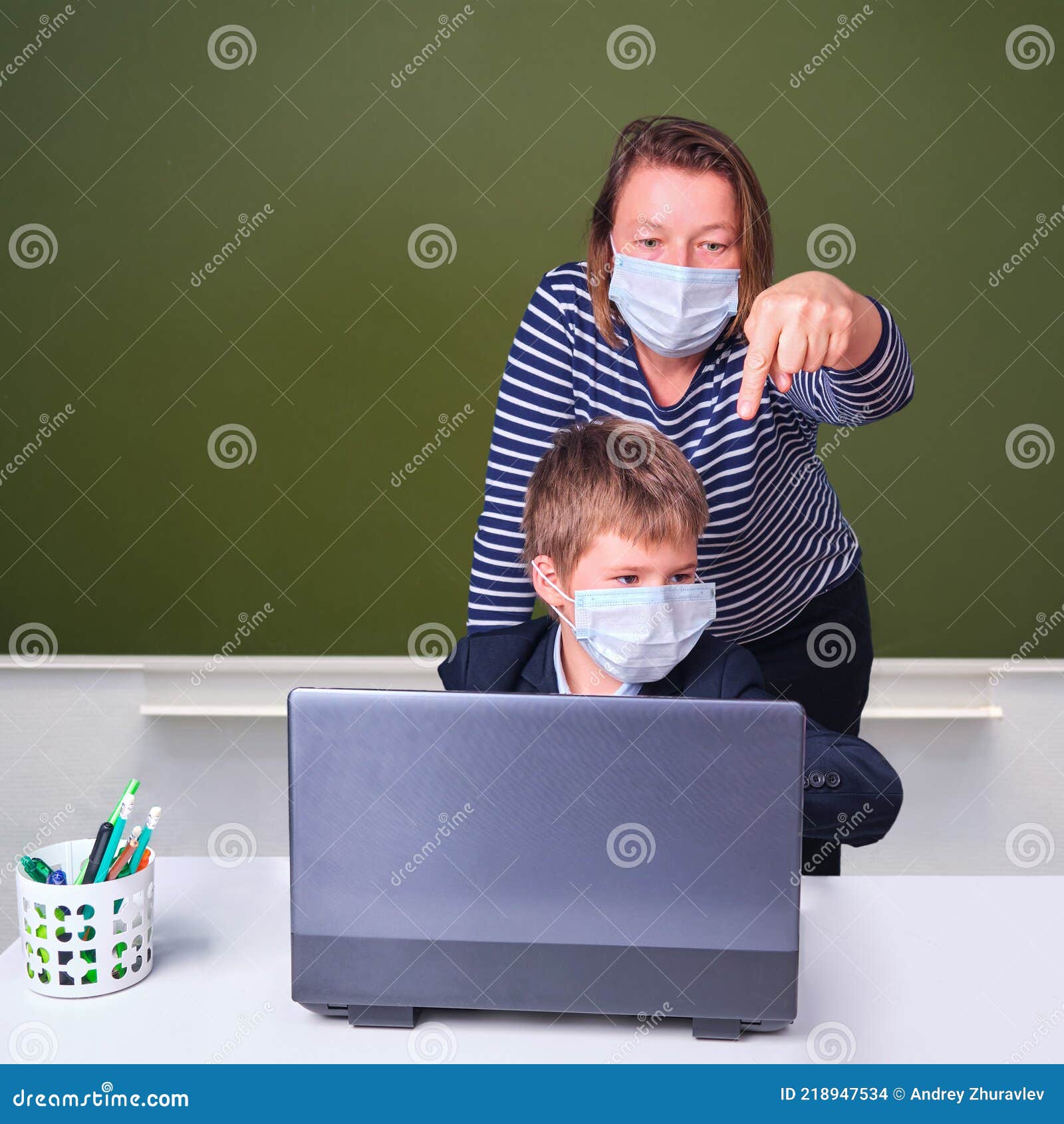 Teacher and Schoolboy during Distance Learning in Elementary School ...