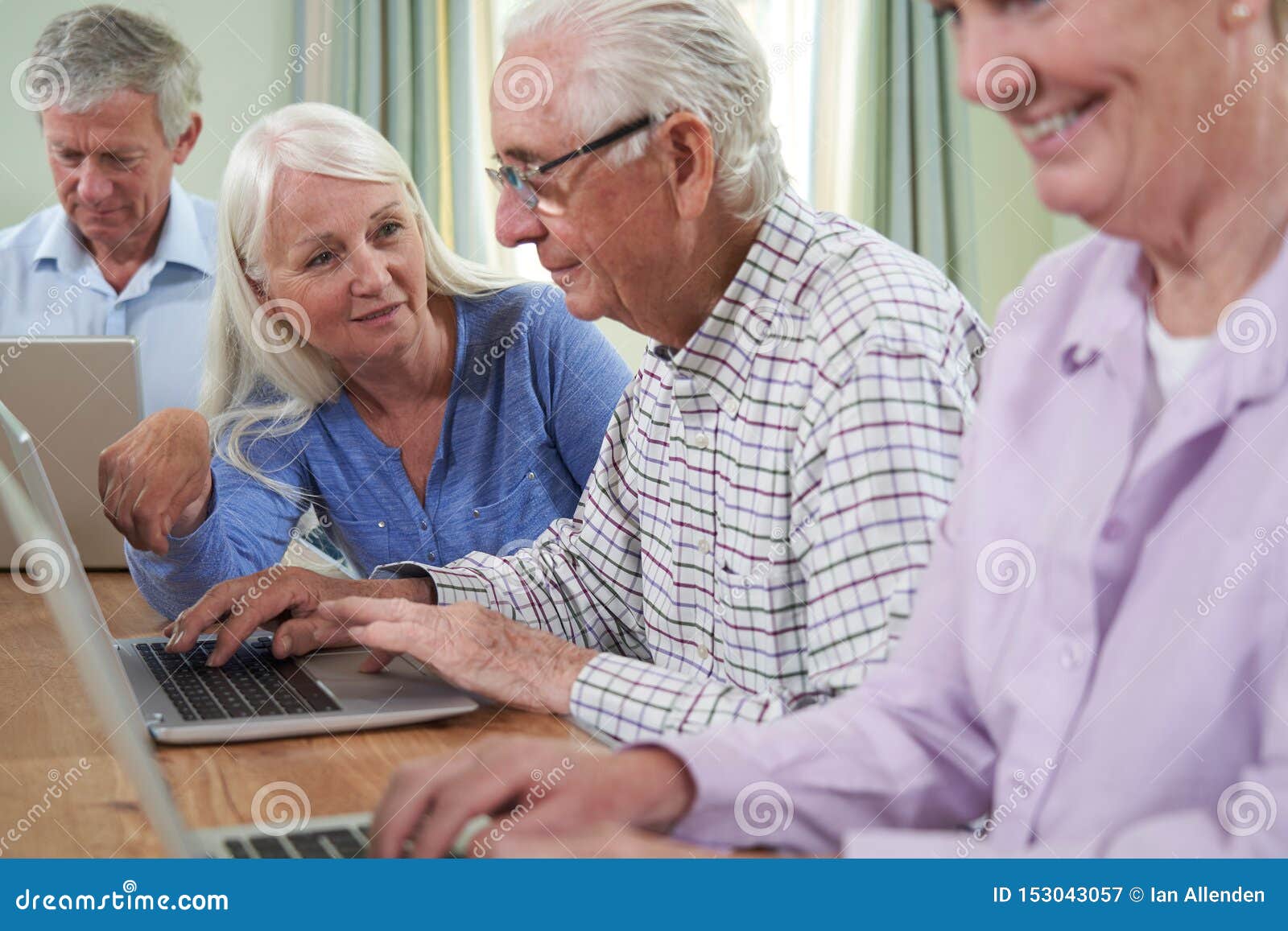 Teacher with Senior Students in Computing Adult Education Class Stock ...