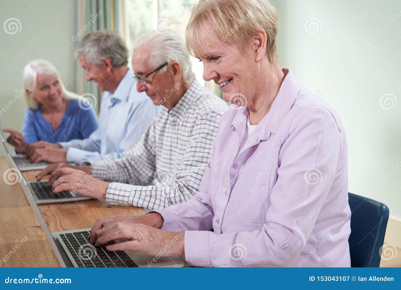 Teacher with Senior Students in Computing Adult Education Class Stock ...