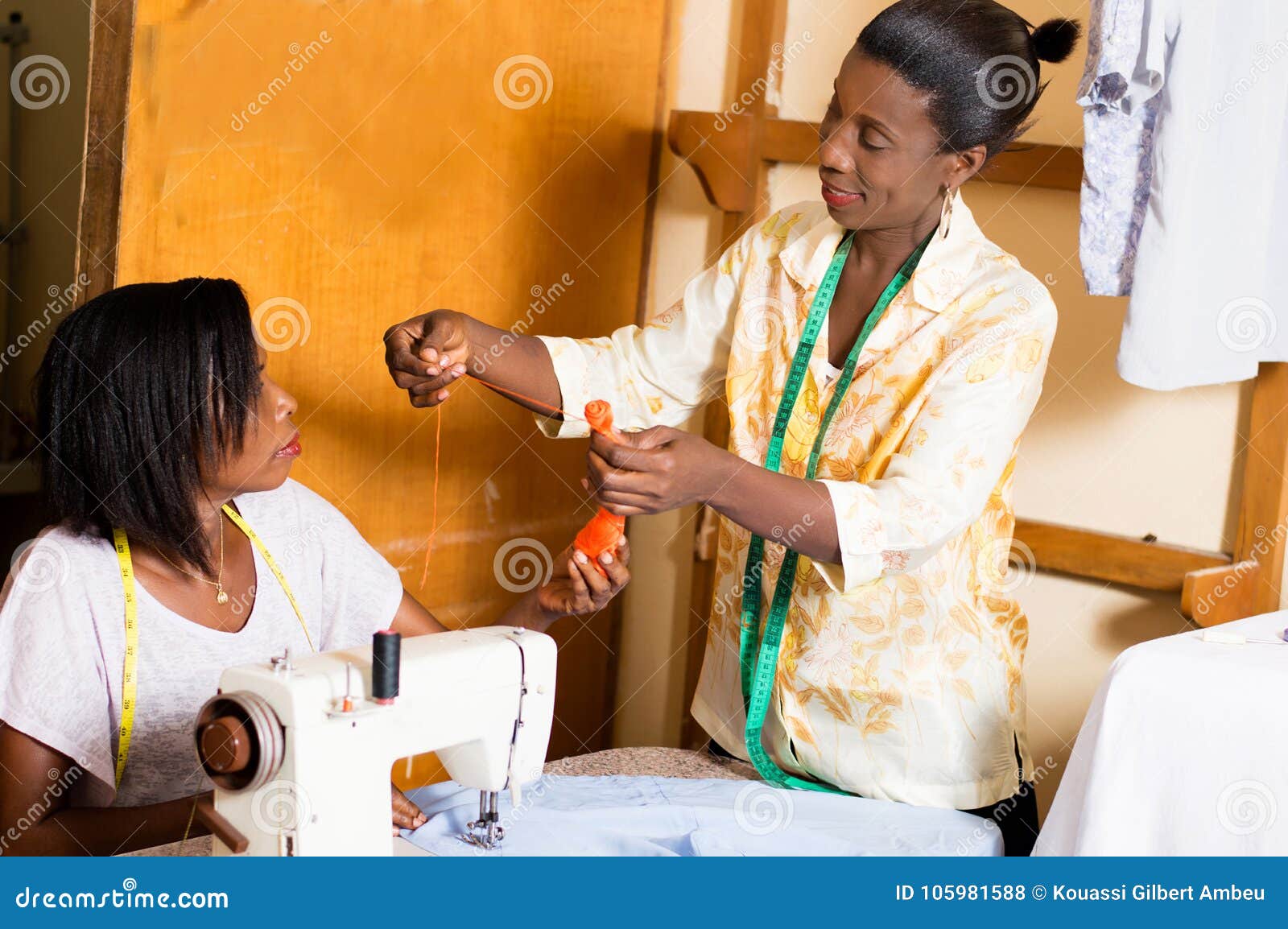 The Teacher in Sewing and His Student. Stock Photo - Image of spool ...