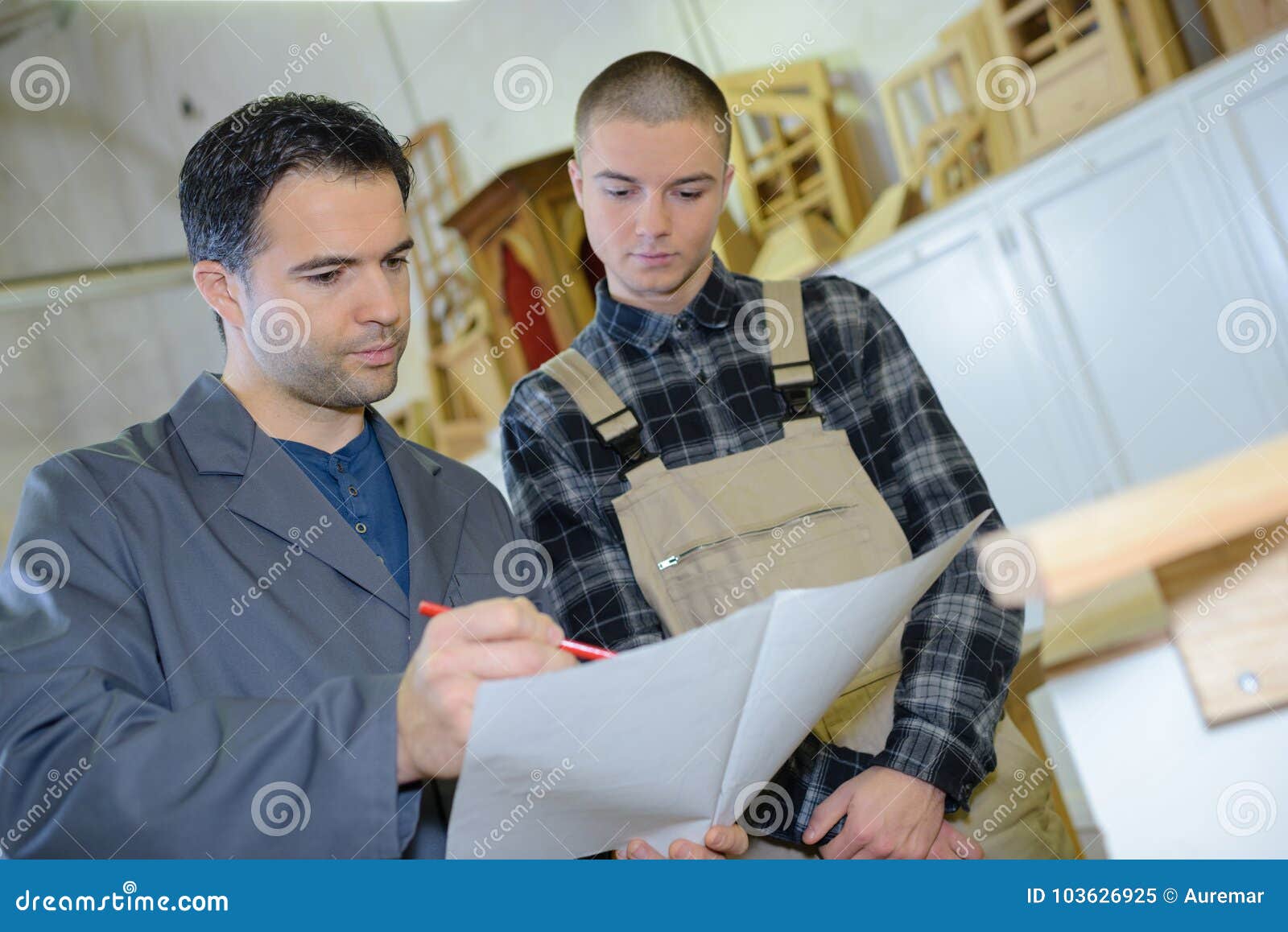 Teacher Showing Cabinet Designs To Apprentice Stock Image - Image of ... Teacher Showing Cabinet Designs To Apprentice Stock Image - Image of ...