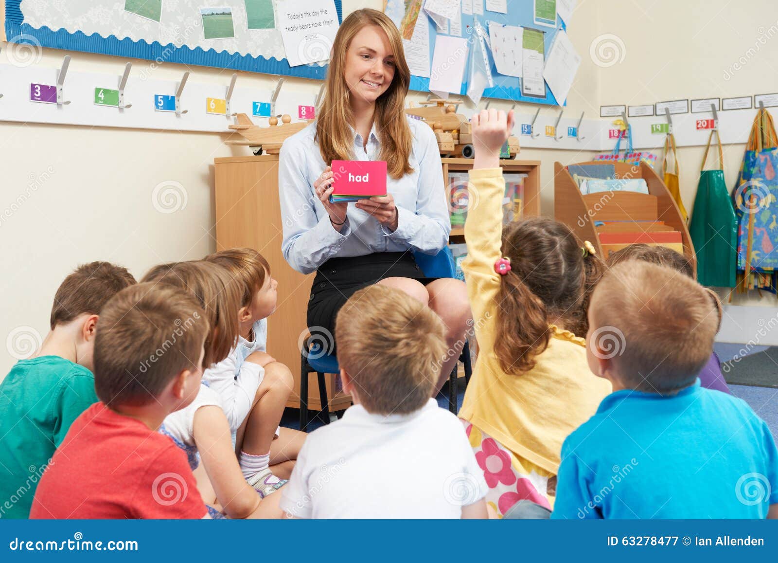 Teacher Showing Flash Cards To Elementary School Class Stock Image ...