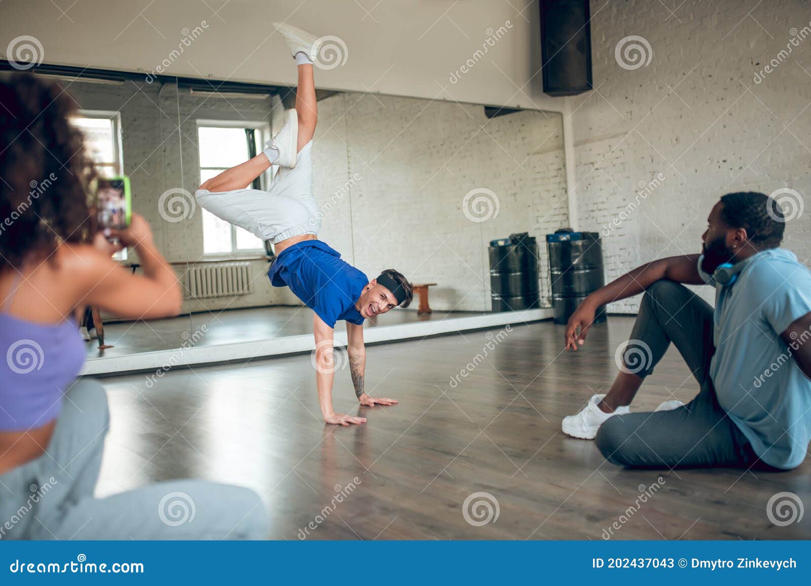 Teacher Showing a Handstand To His Students Stock Image - Image of ...